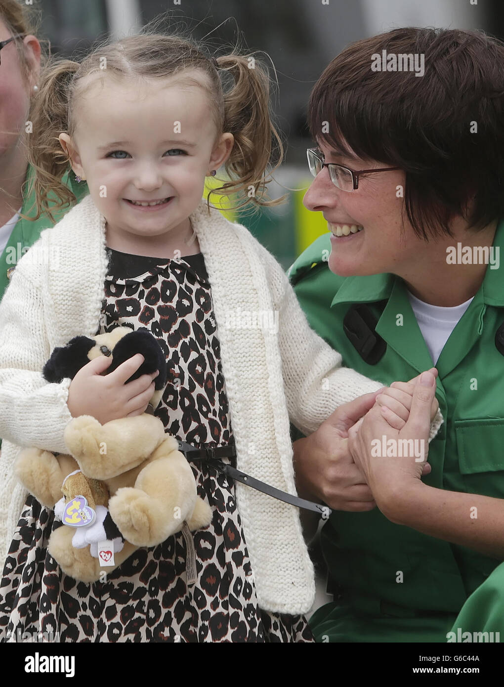 Girl meets life-saving paramedics Stock Photo - Alamy