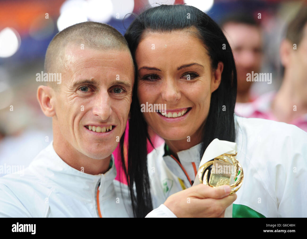 Winner of the Men's 50km Walk, Ireland's Robert Heffernan with his wife ...