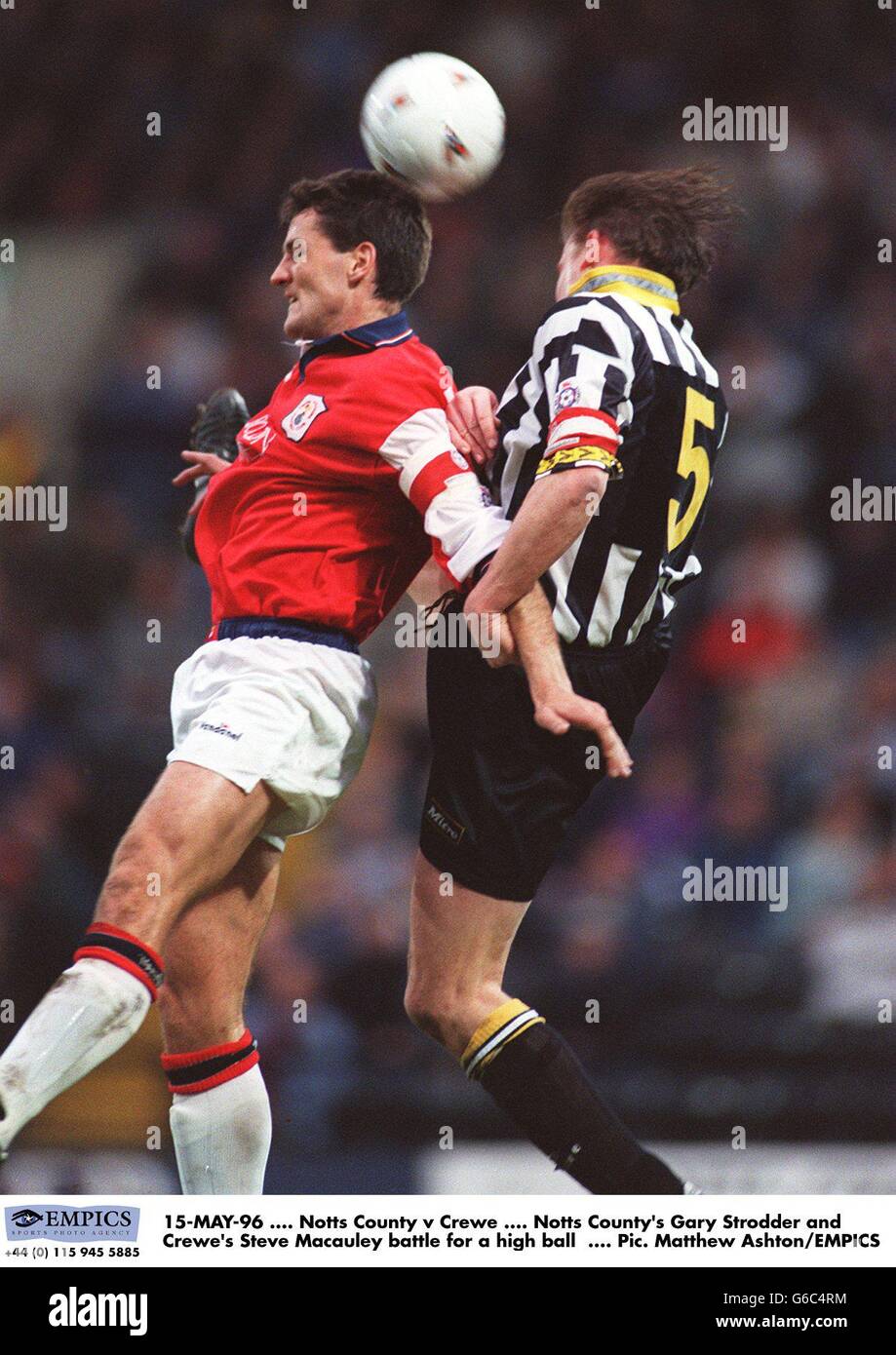 Notts County's Gary Strodder and Crewe's Steve Macauley battle for a ...