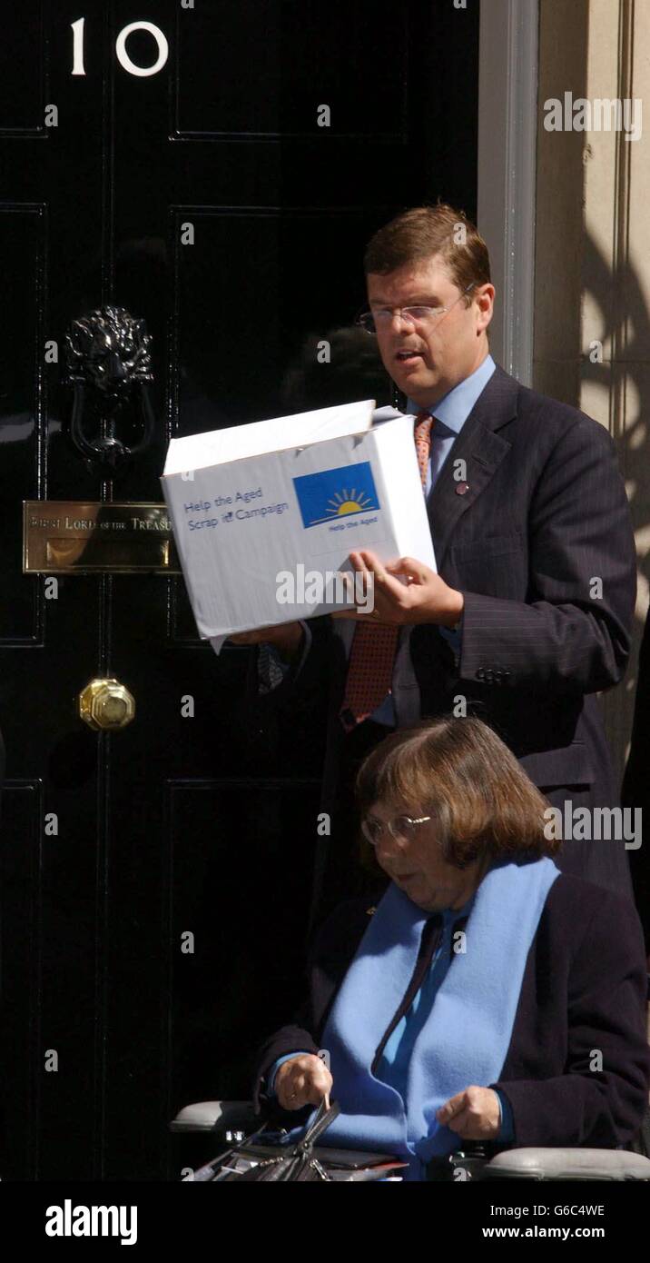 A petitioner from Help the Aged Anne McFarlane with Liberal Democrat MP ...