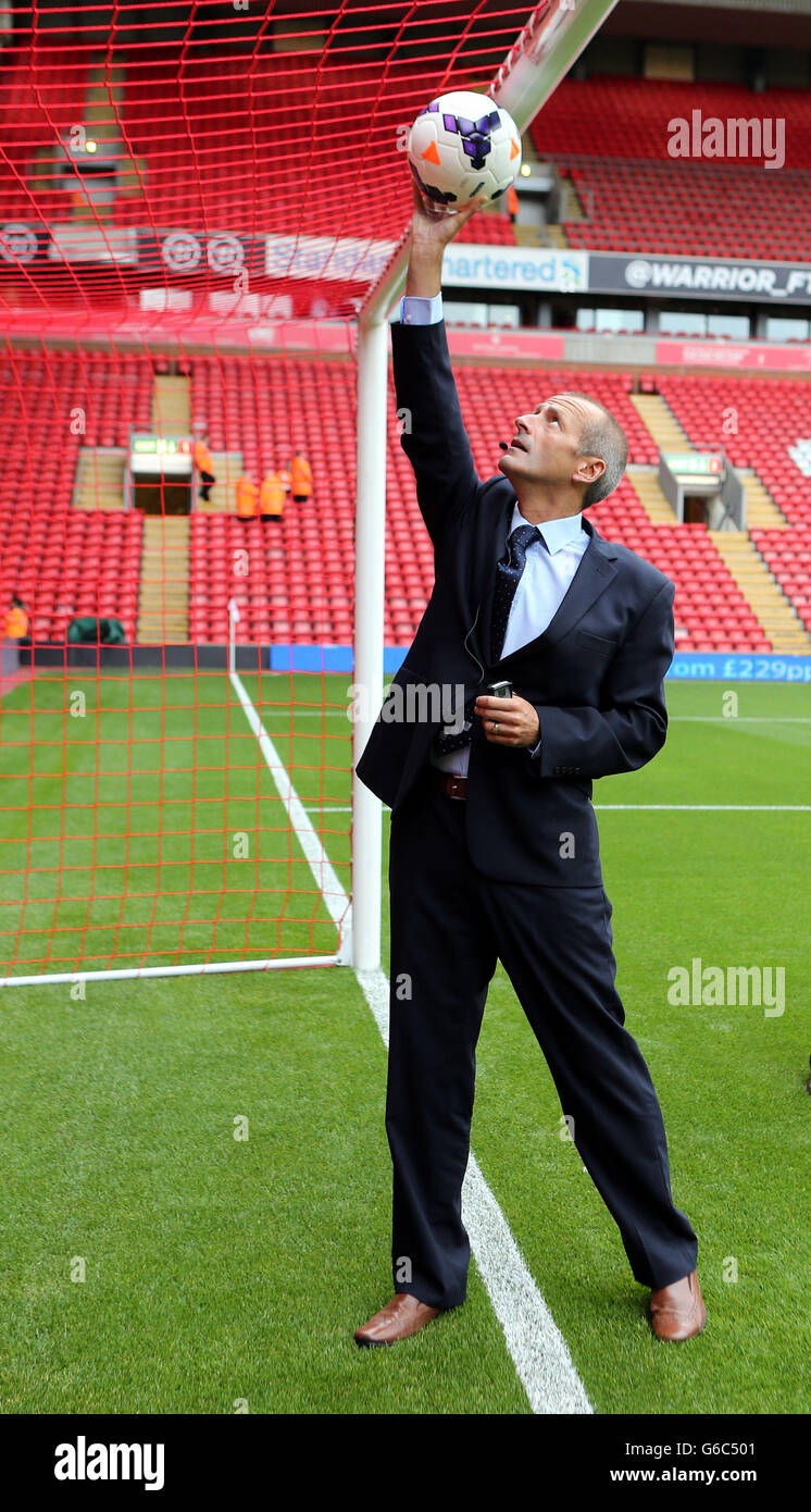 Referee Martin Atkinson tests Hawkeye before the Barclays Premier ...