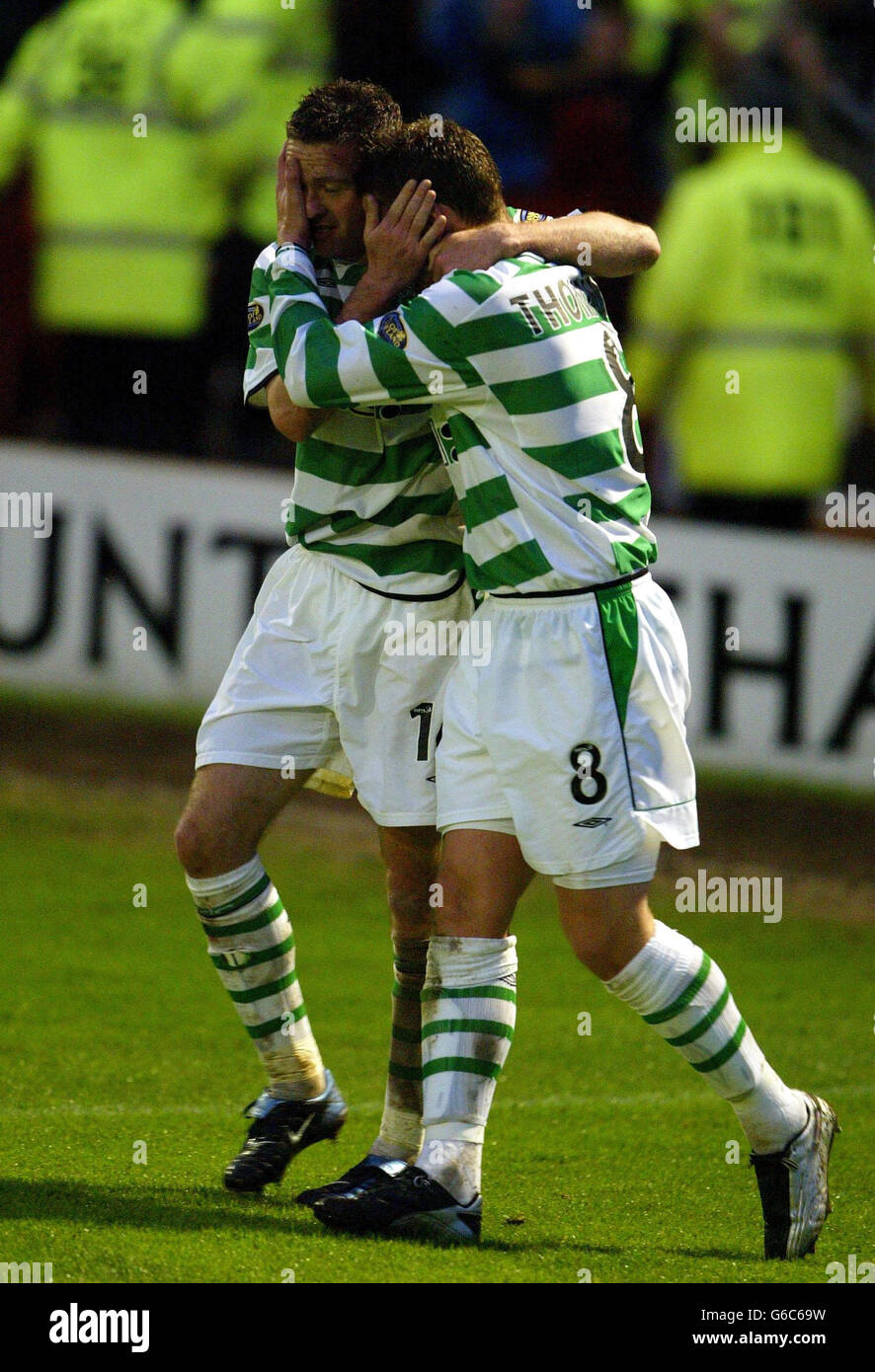 Sport football celebrating hugging alan thompson hi-res stock ...