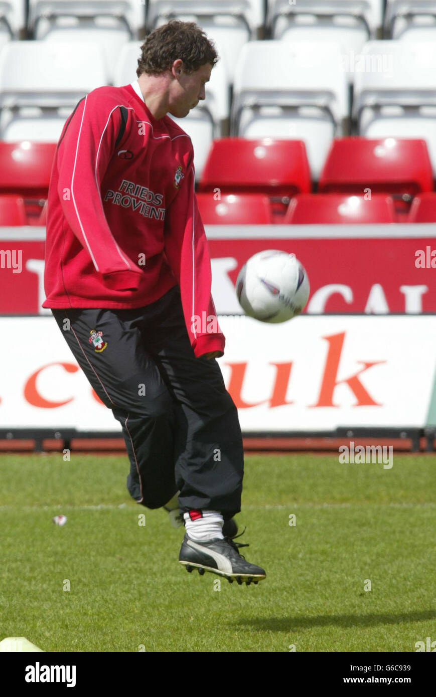Sport football action training mid air wayne bridge hi-res stock ...