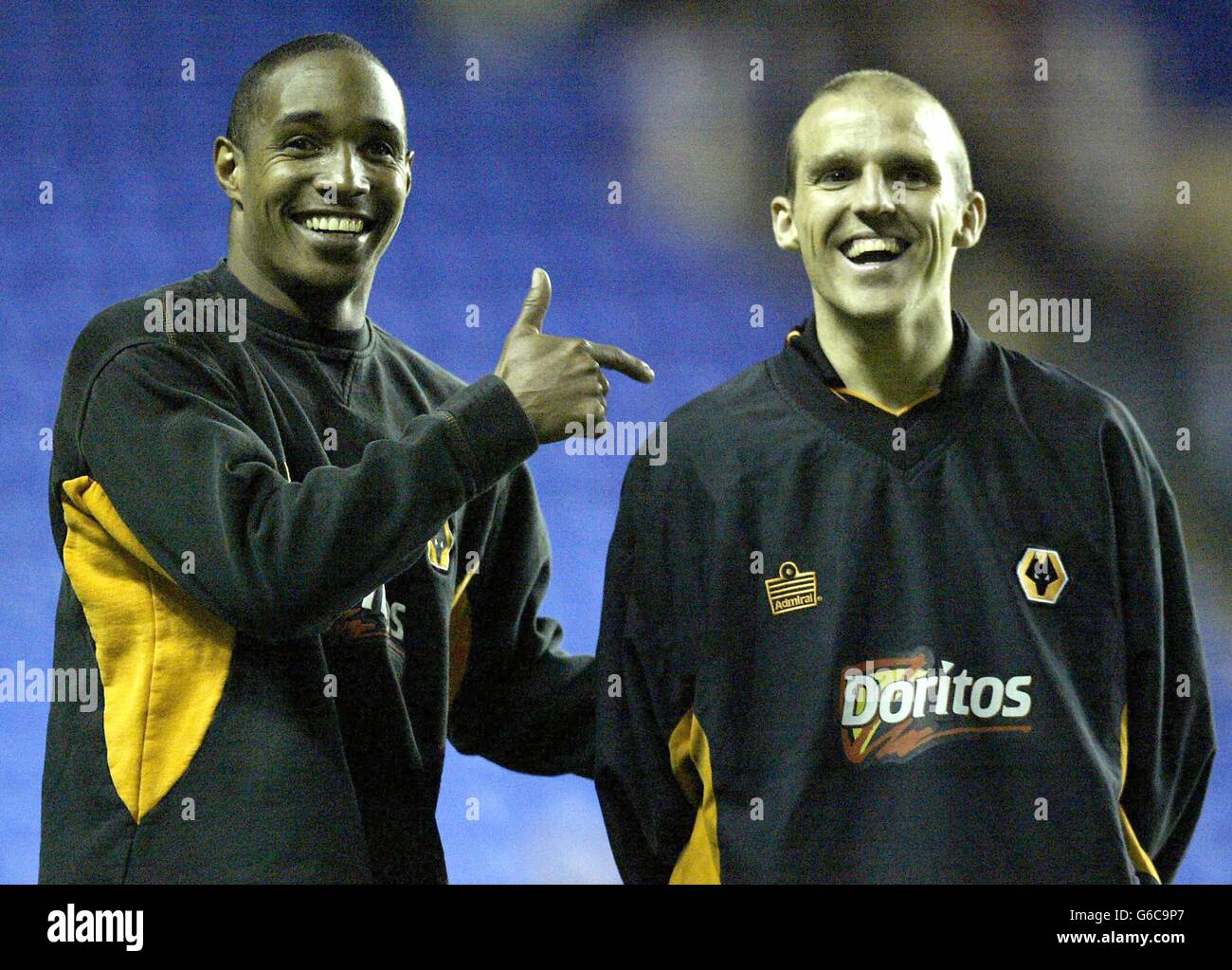 Wolverhampton Wanderers' Paul Ince (left) points to goalscorer Alex Rae ...