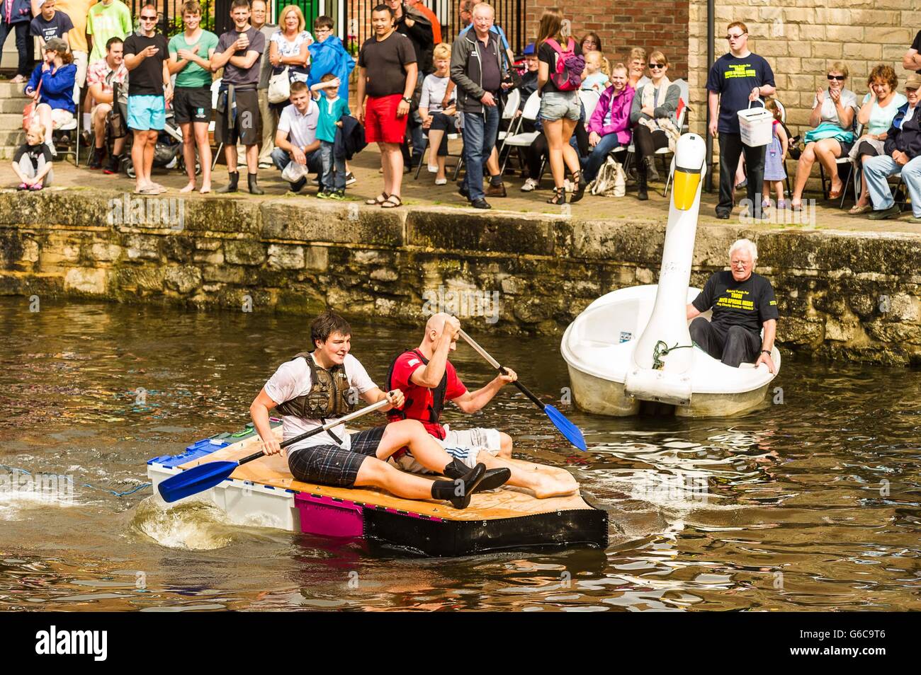 Competitors take part in The Great Ripon Raft Race 2013, where teams ...