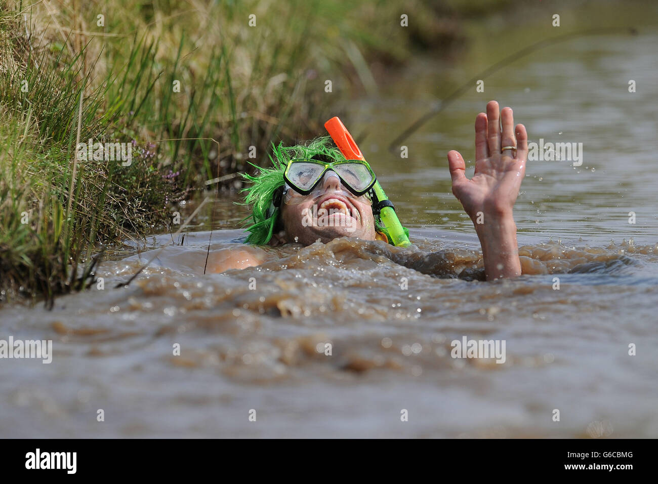 A competitor during the annual World Bog Snorkelling Championship which ...