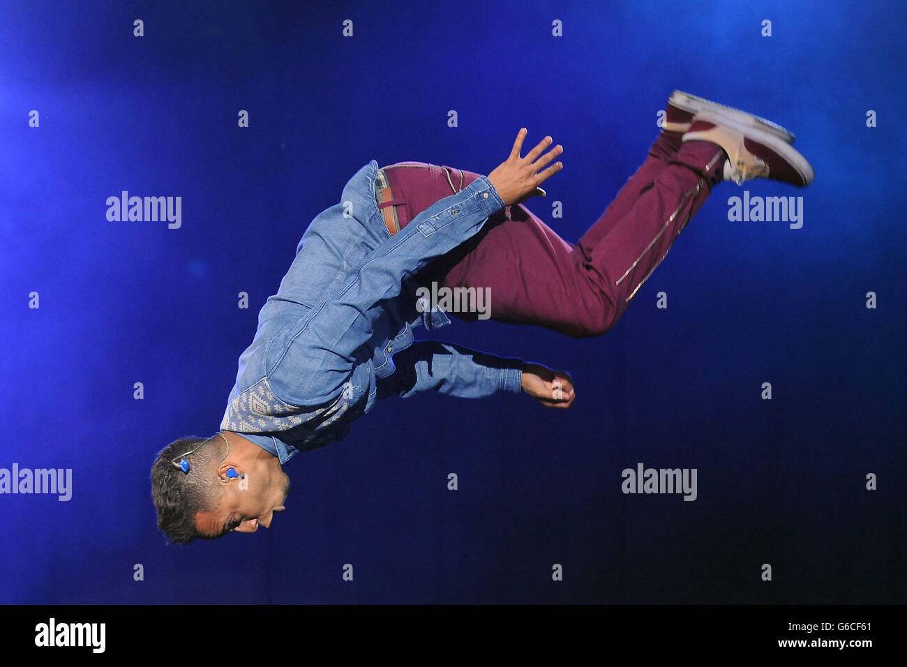 Aston Merrygold of JLS performs a backflip during day one of the Fusion ...