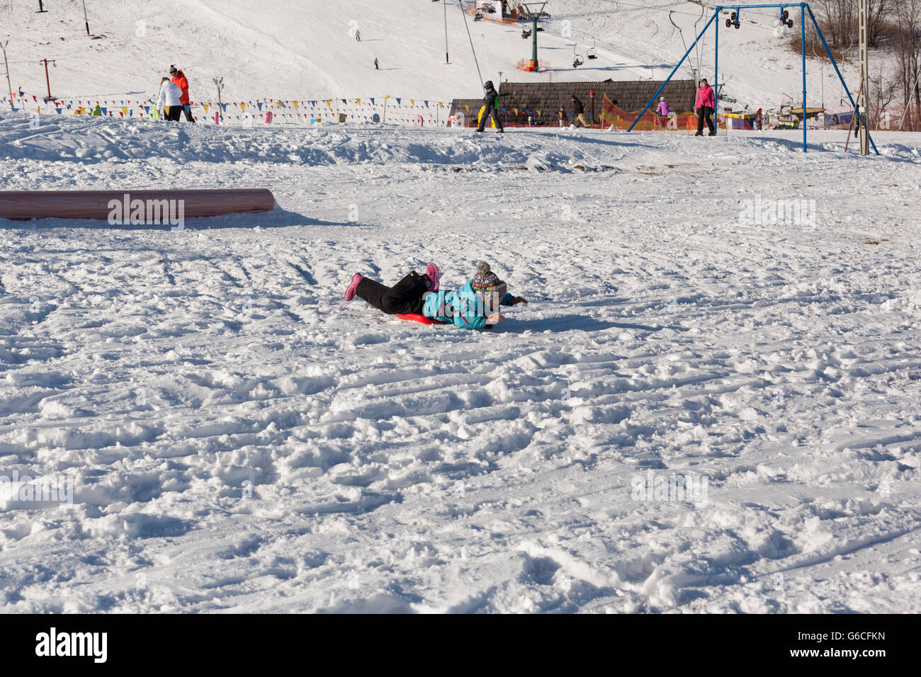 Skiing and sliding, winter time in Tatra Mountains Stock Photo - Alamy