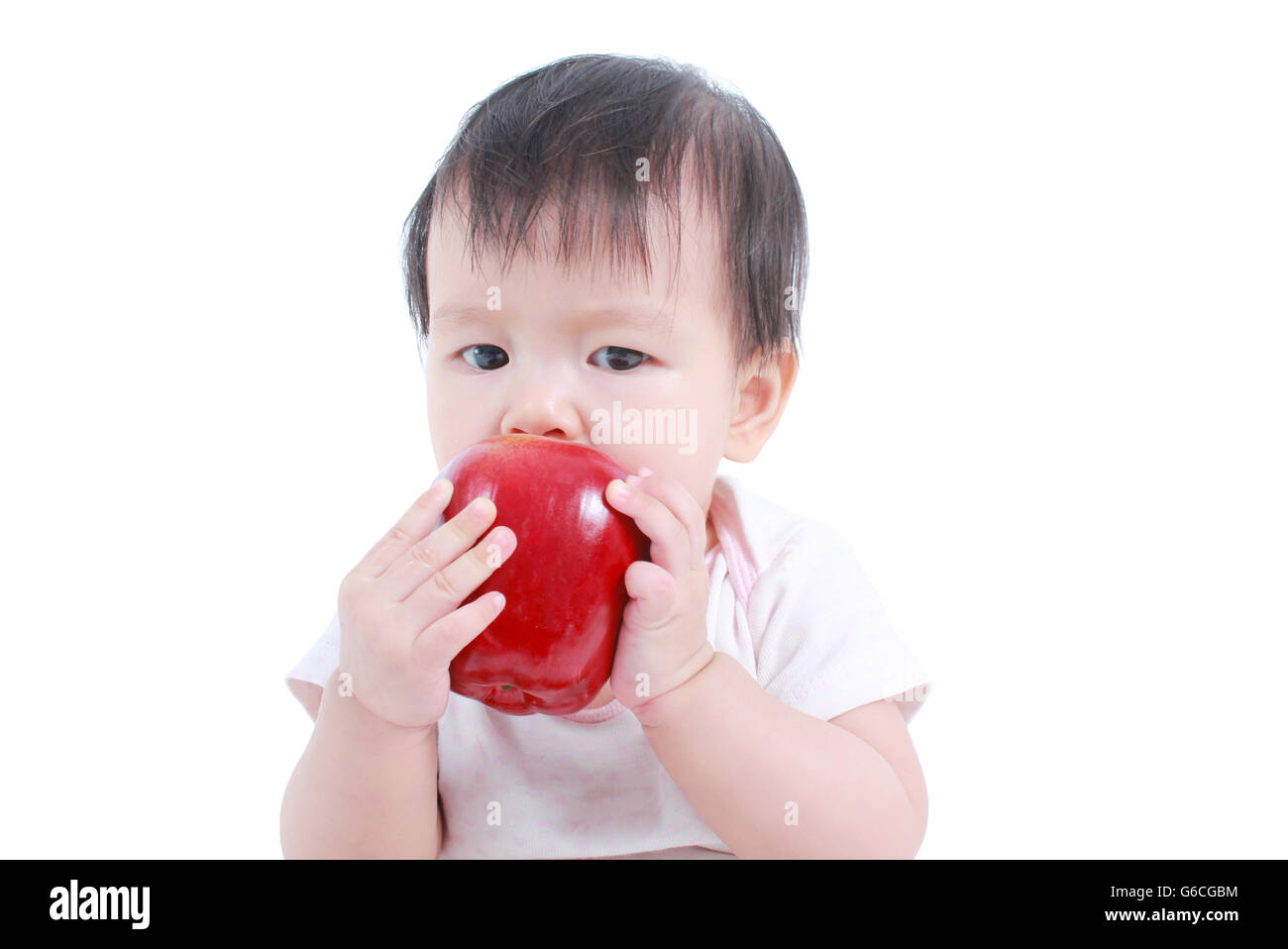 Cute baby with red apple (eating healthy food Stock Photo - Alamy
