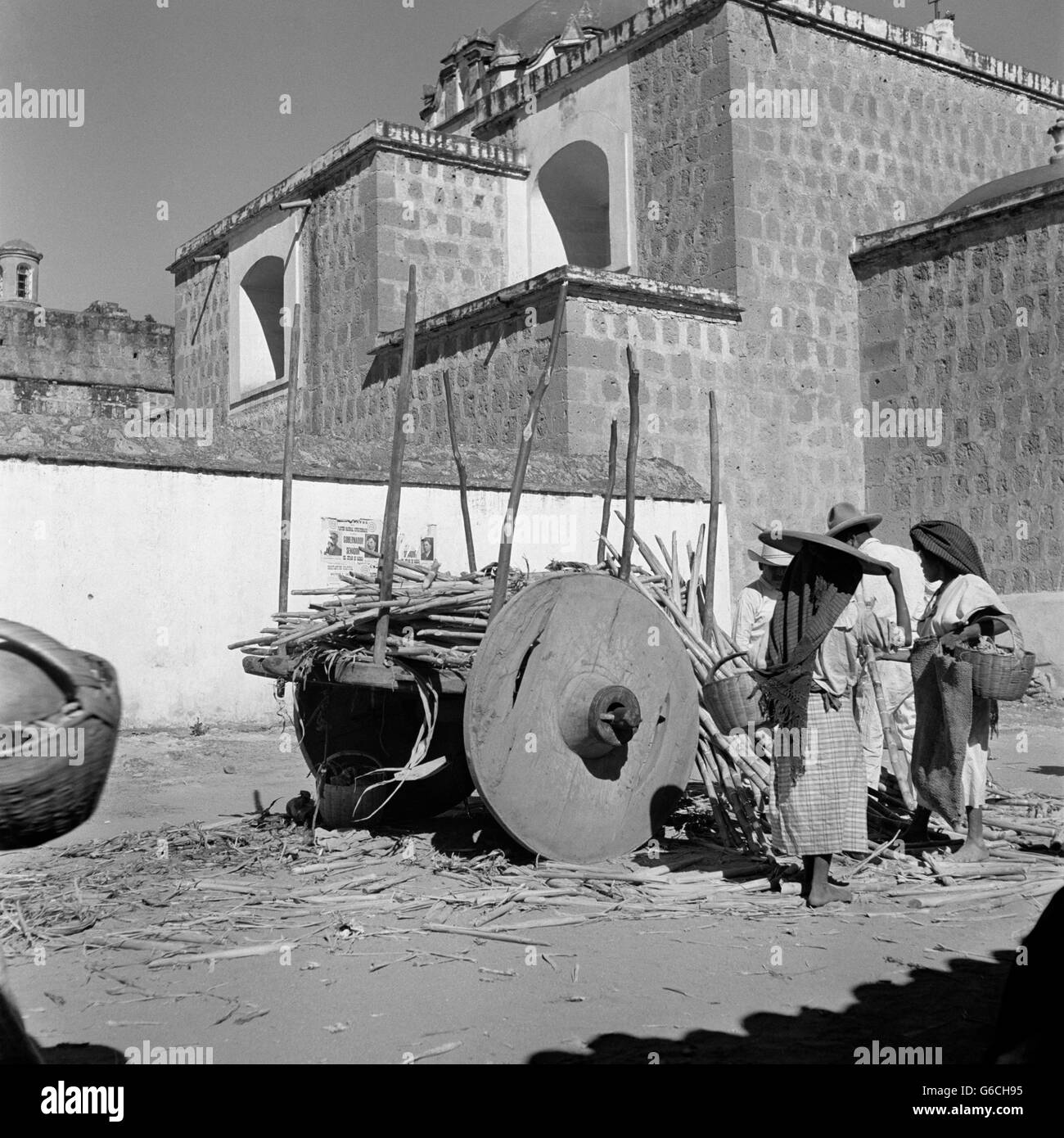 1930s OX CART LOADED WITH SUGAR CANE AND VENDORS IN OUTDOOR MARKET ...