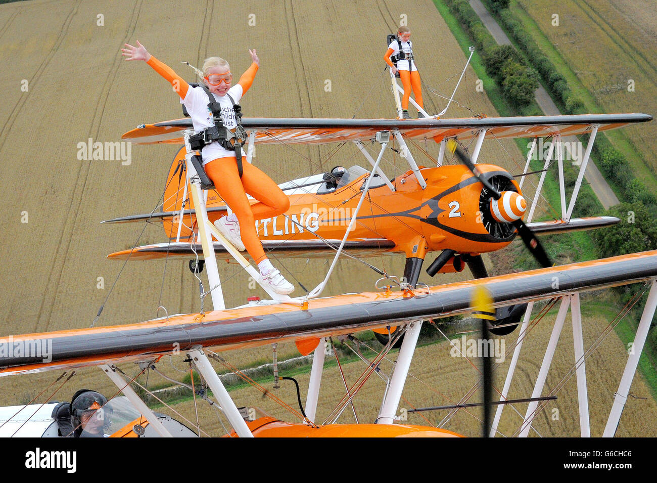 Nine-year-old cousins Rose Powell (front) and Flame Brewer wingwalking ...