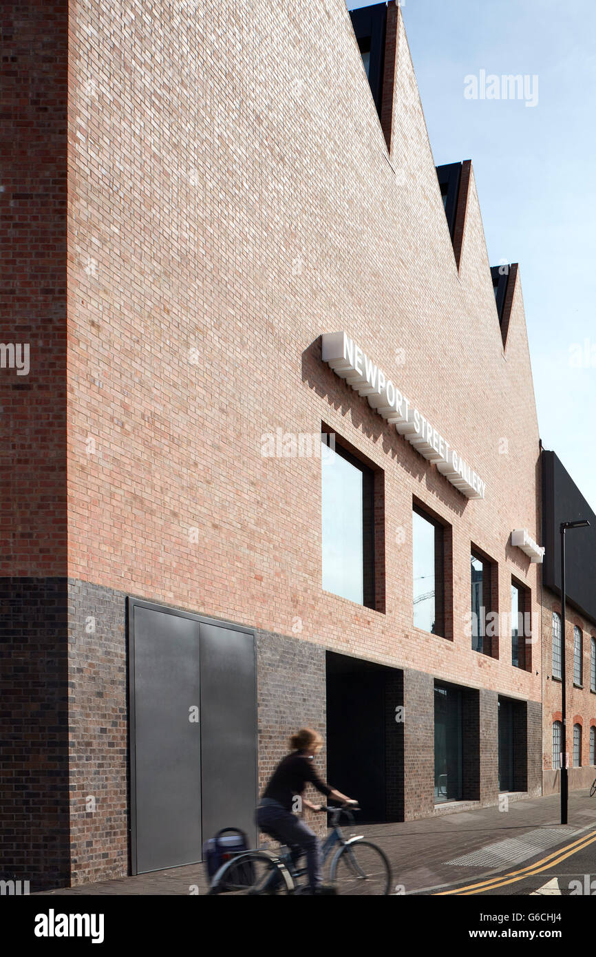 Angled partial view from street focusing on entrance with cyclist ...
