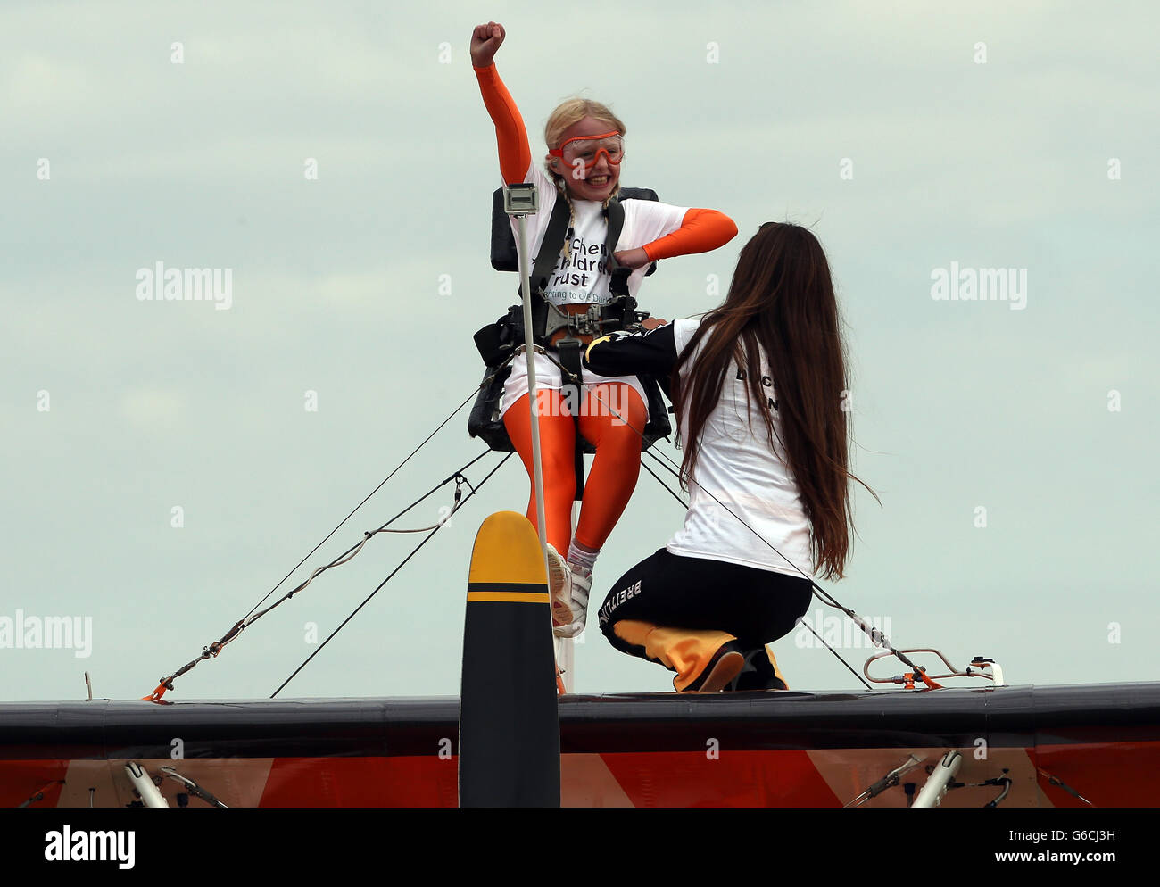 Nine-year-old Rose Powell prepares to go wing-walking over Rendcomb ...