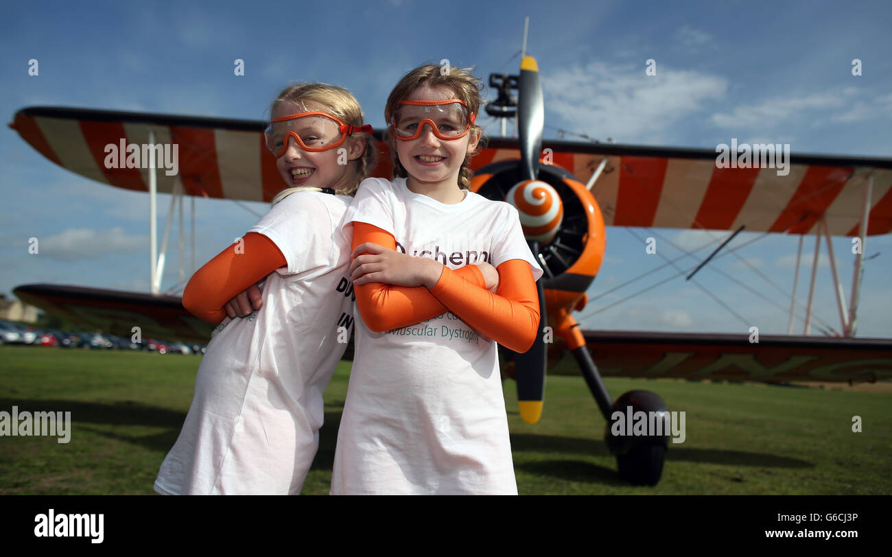 Nine-year-old cousins Rose Powell (left) and Flame Brewer prepare to go ...
