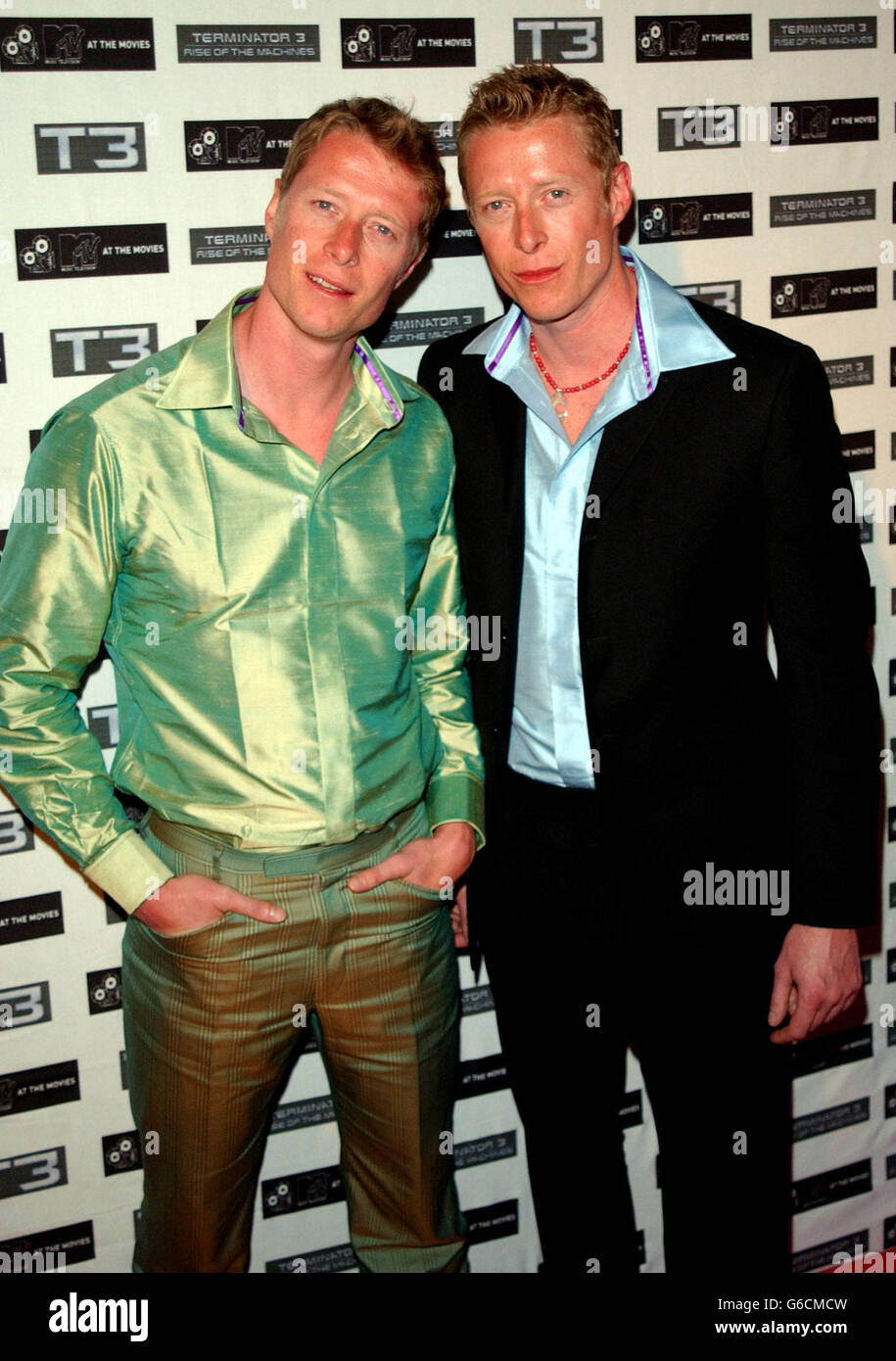 Twin actors Neil (left) and Adrien Rayment pose for photographers as ...