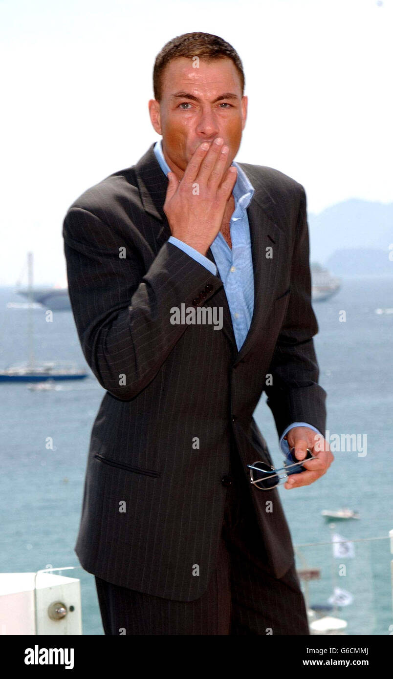 Actor Jean Claude Van Damme poses for photographers on the roof of the ...