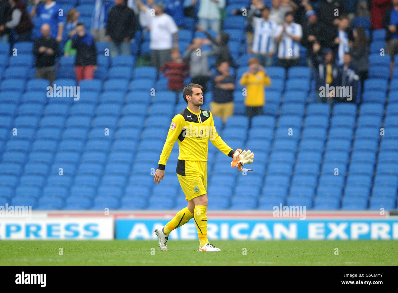 Burnley goalkeeper Tom Heaton walks off after being shown the red card ...
