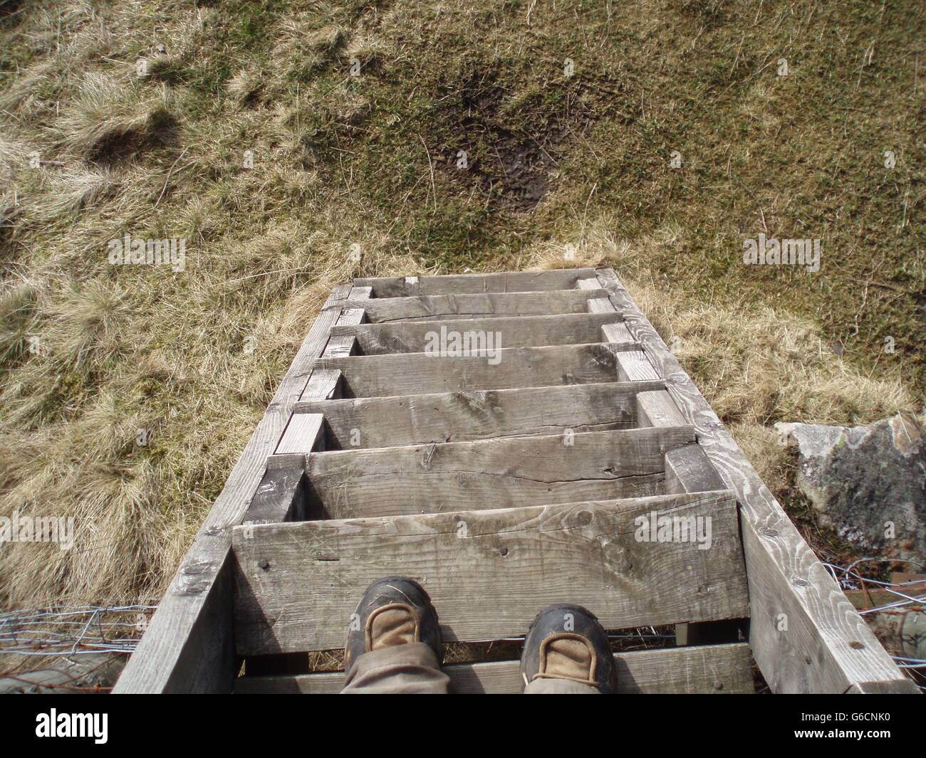wooden steps and feet Stock Photo - Alamy