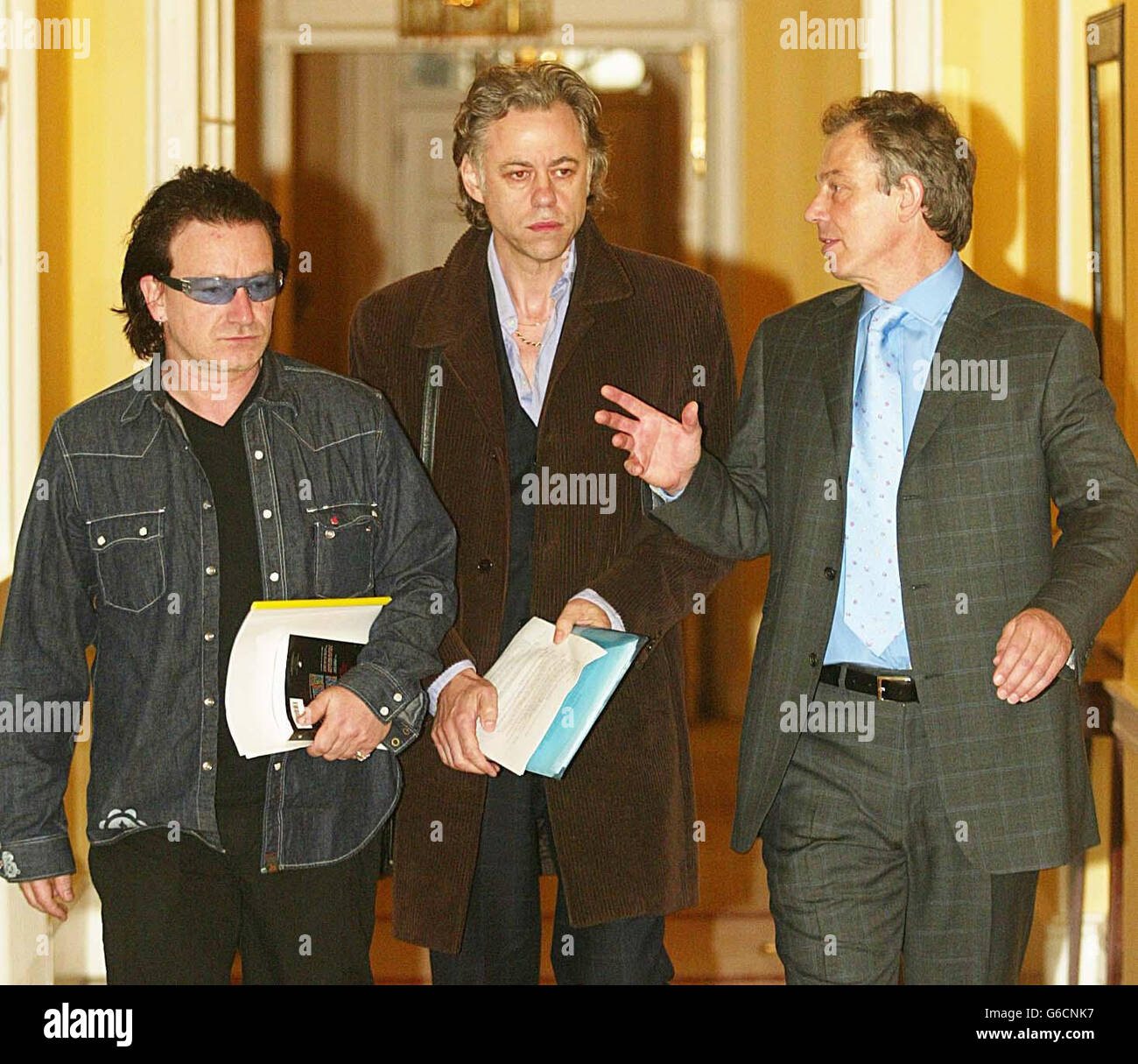 Prime Minister Tony Blair, with Sir Bob Geldof (C) and U2 frontman Bono ...