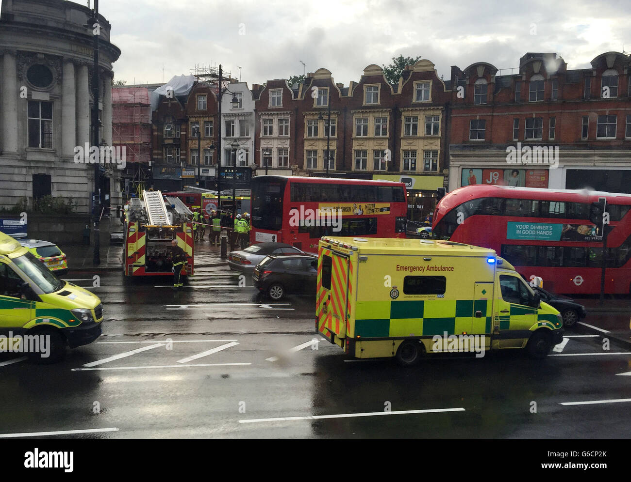 A collision involving a bus, fire engine and car at the junction of ...