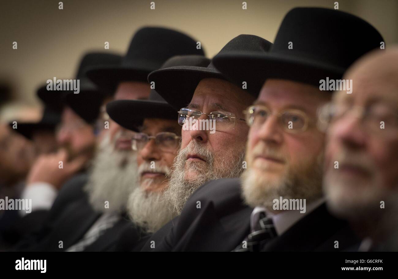 Rabbis and members of the Orthodox Jewish community attend the ...
