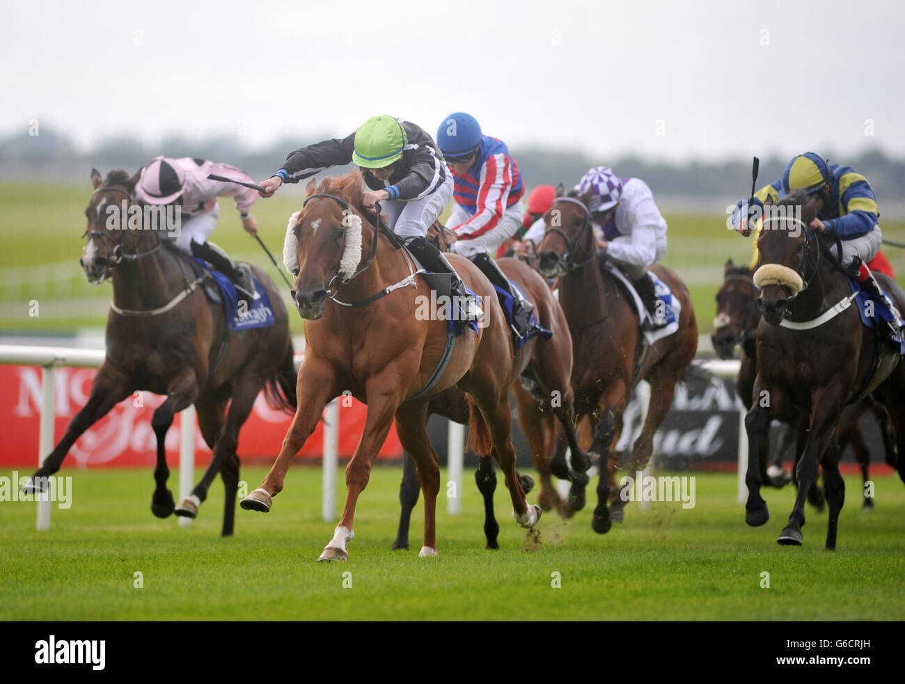 Jockey Ronan Whelan (centre) rides Moran Gra to victory in Irish ...