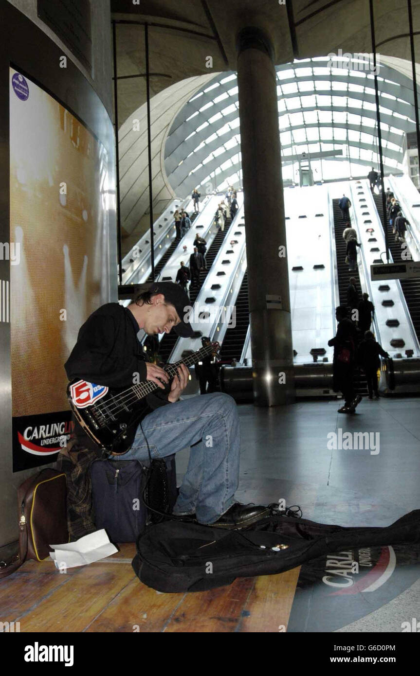 Justin Manser performs on the first day of licensed busking on the ...