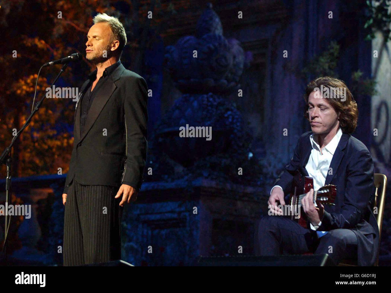 Sting dominic miller on stage at the royal albert hall hi-res stock ...
