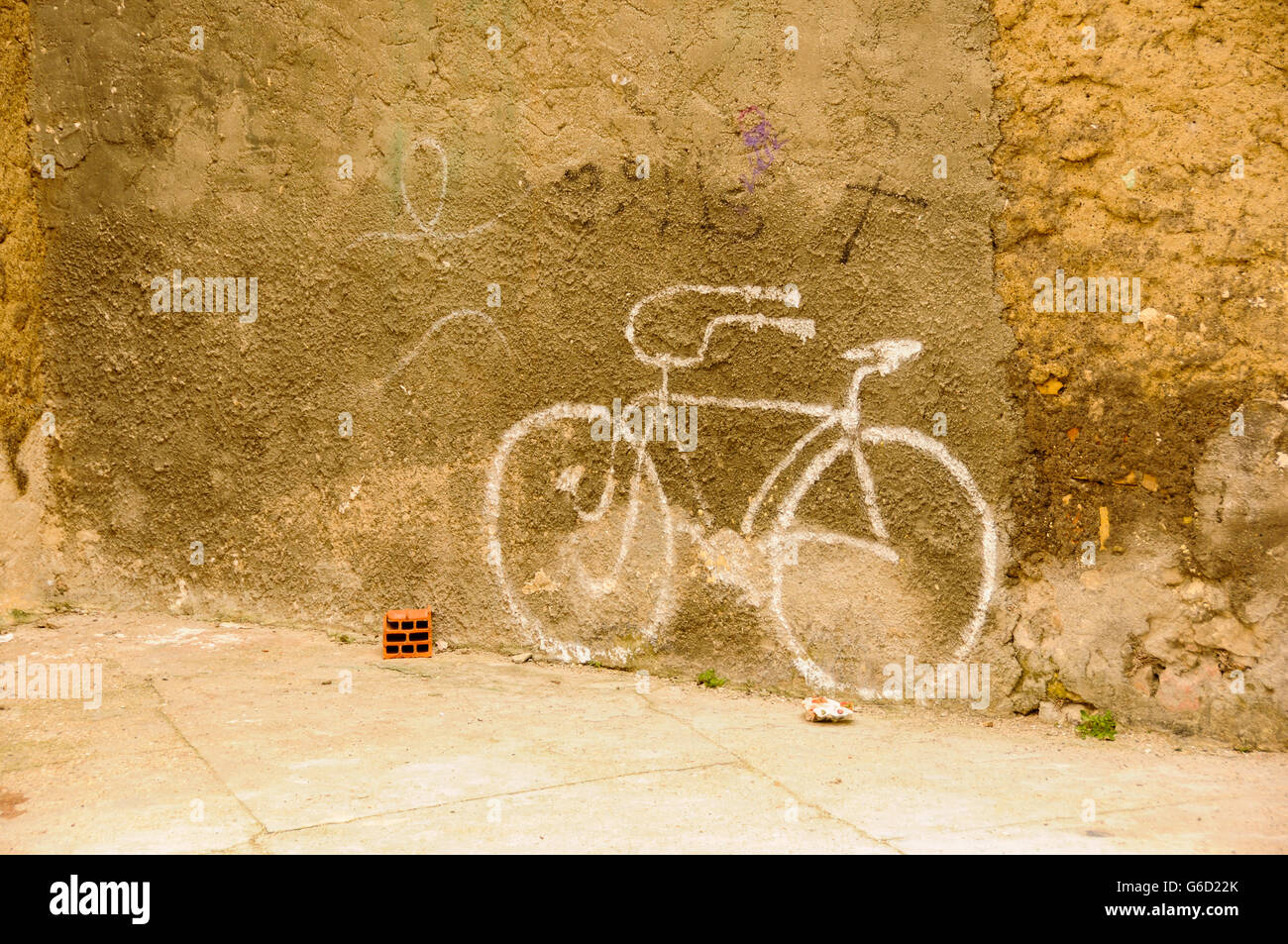 white chalk drawing of bicycle on stone wall Stock Photo - Alamy