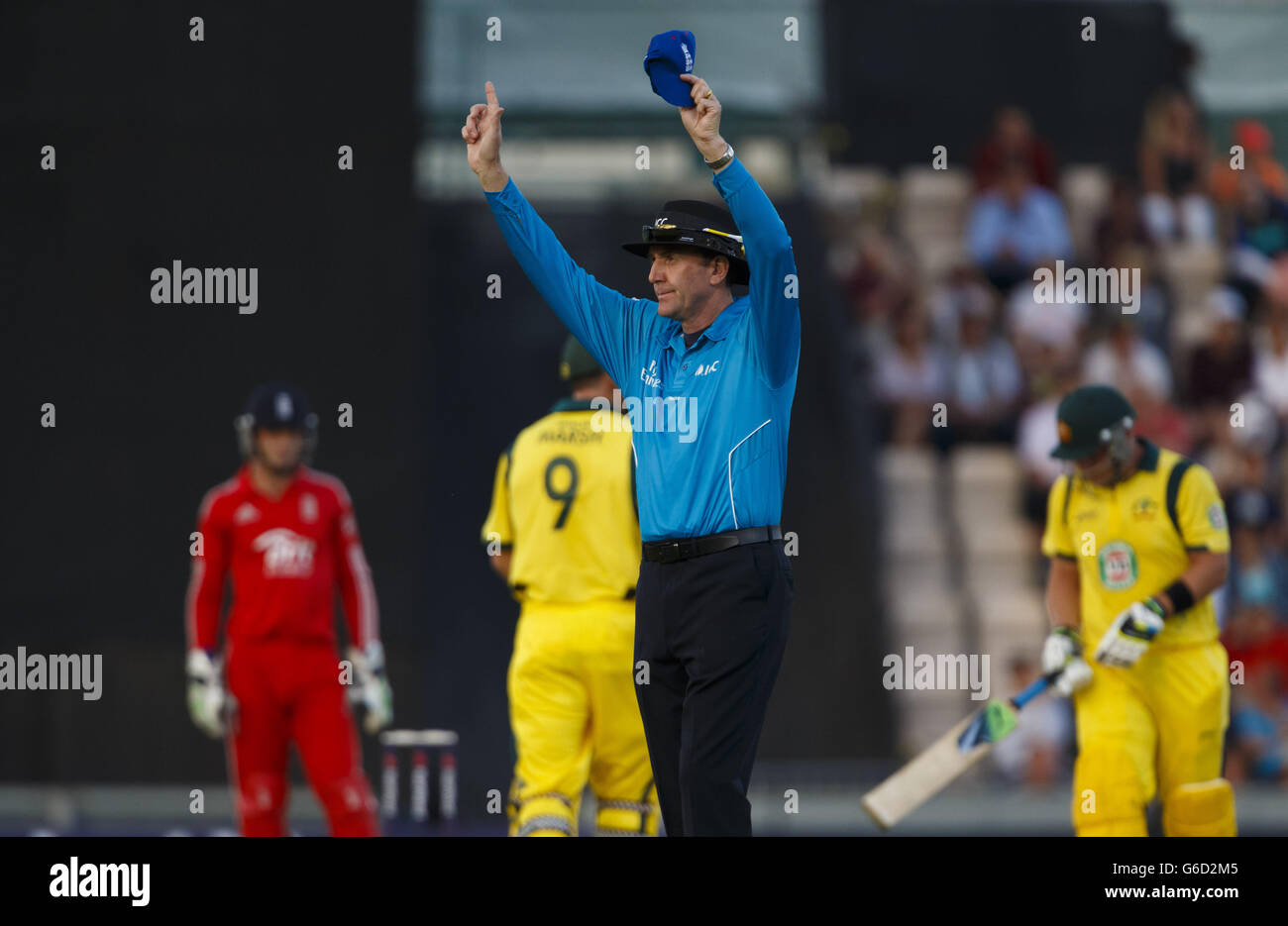 Umpire Rob Bailey signals another six for Australia's Aaron Finch ...
