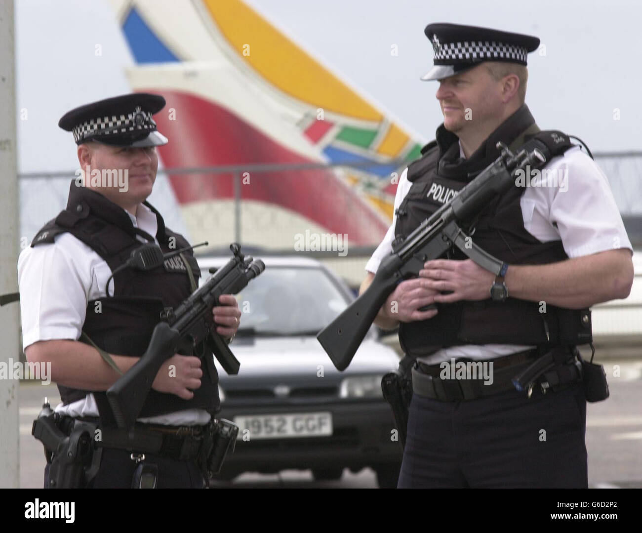 Heathrow armed police Stock Photo - Alamy