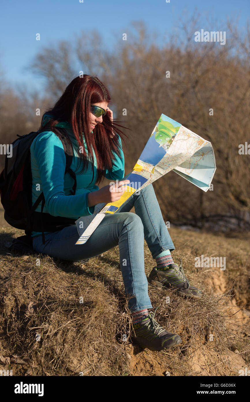 Woman with map Stock Photo - Alamy