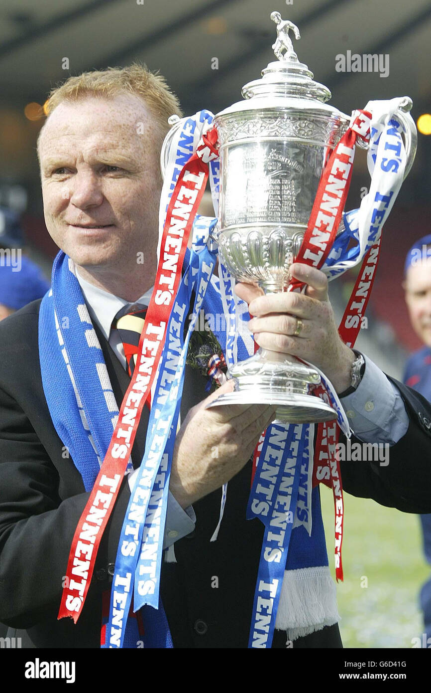 Rangers' manager Alex McLeish with the trophy after his side's 1-0 win ...