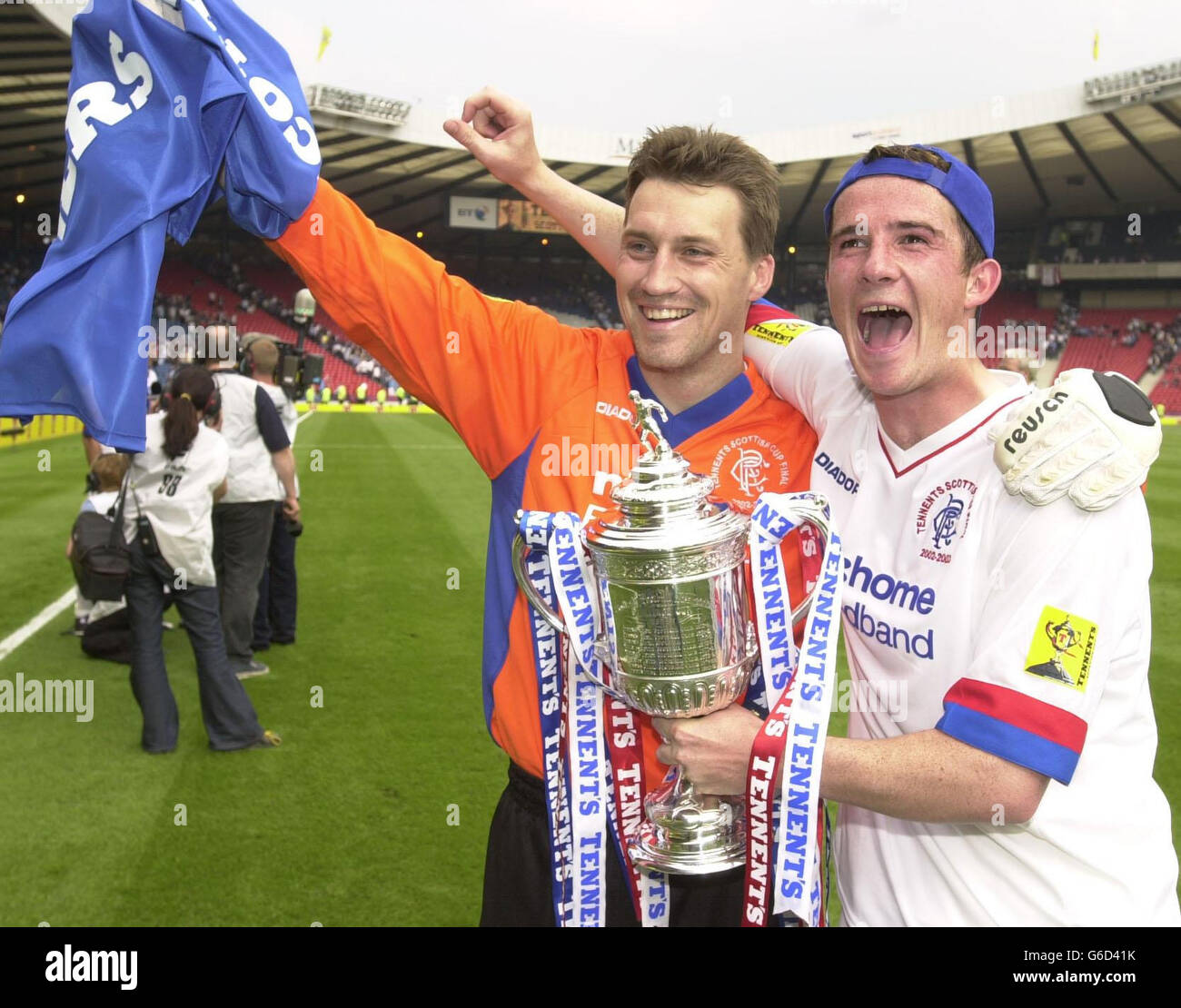Ranger's players Stefan Kloss and Barry Ferguson celebrate winning the ...