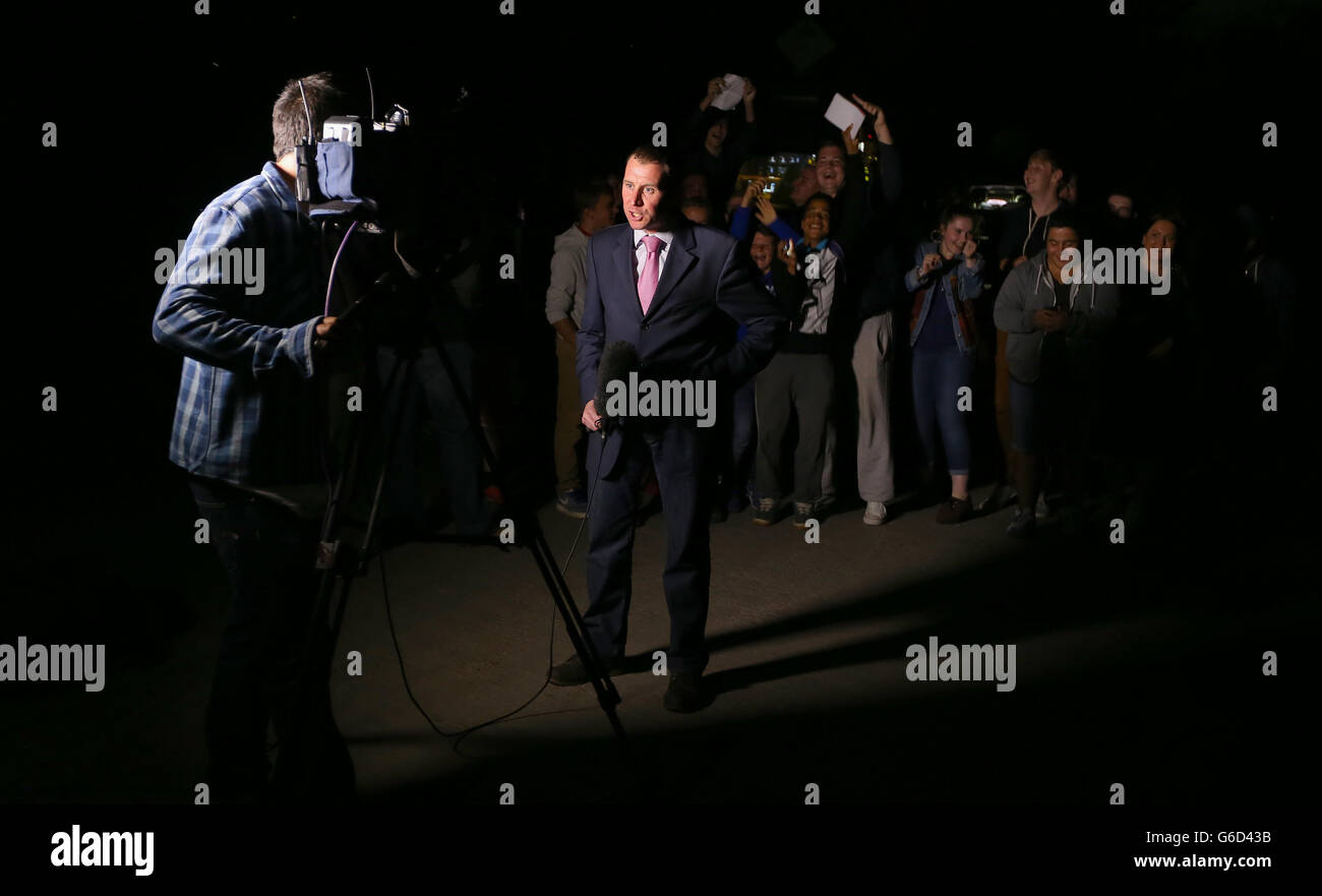 Sky Sports News presenter James Cooper does a live link in front of ...