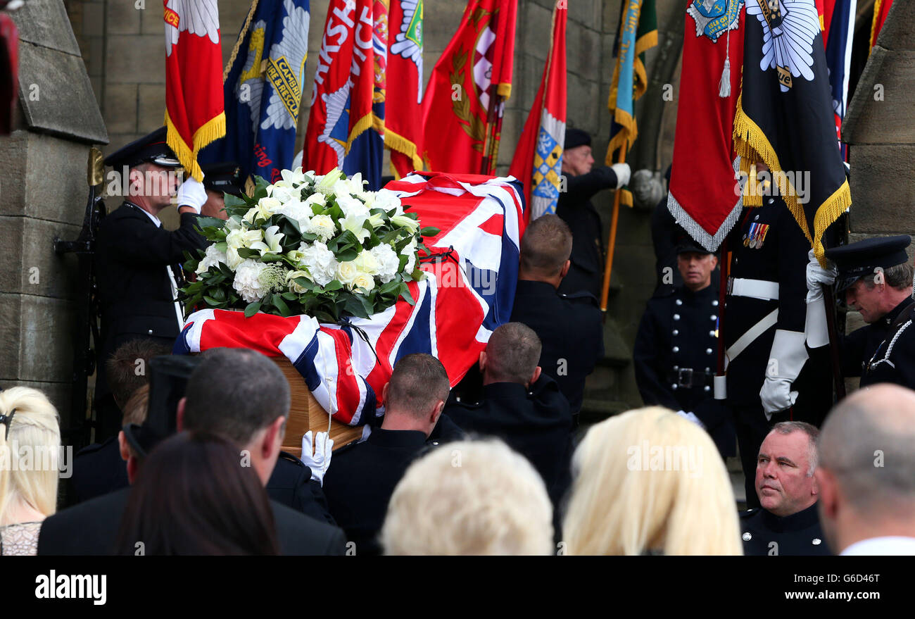 The coffin is carried into Bury Parish Church, Greater Manchester ...
