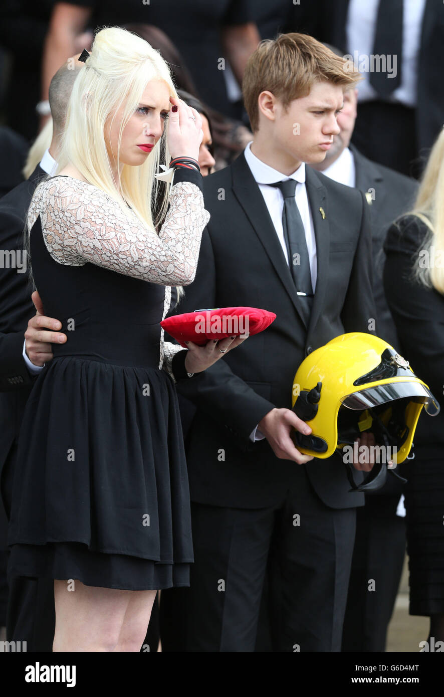 Charlotte (left) and Sam Hunt attend the funeral of their father ...