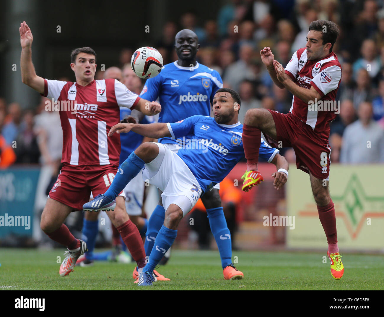 Portsmouth's Andy Barcham trys and over head kick as Cheltenham Town's ...