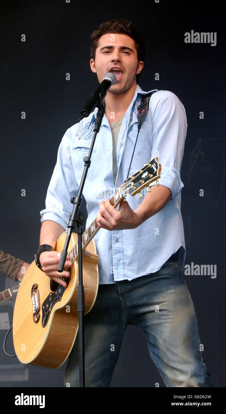 Showbiz music singer celebrity performing on stage singing playing ...