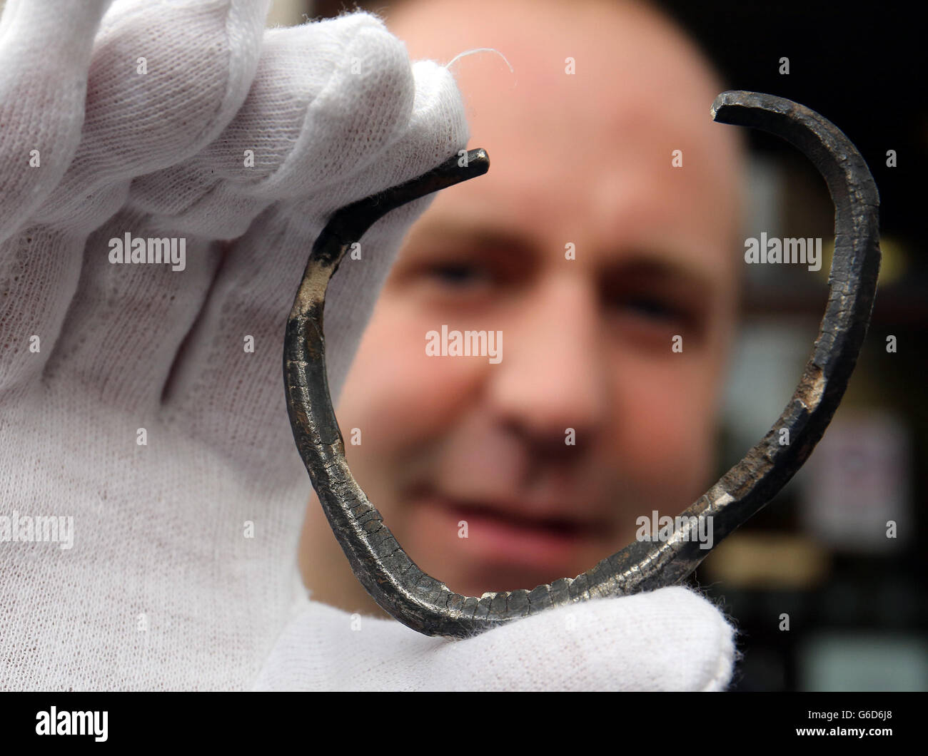 Dirty metal piece was Viking ring Stock Photo - Alamy