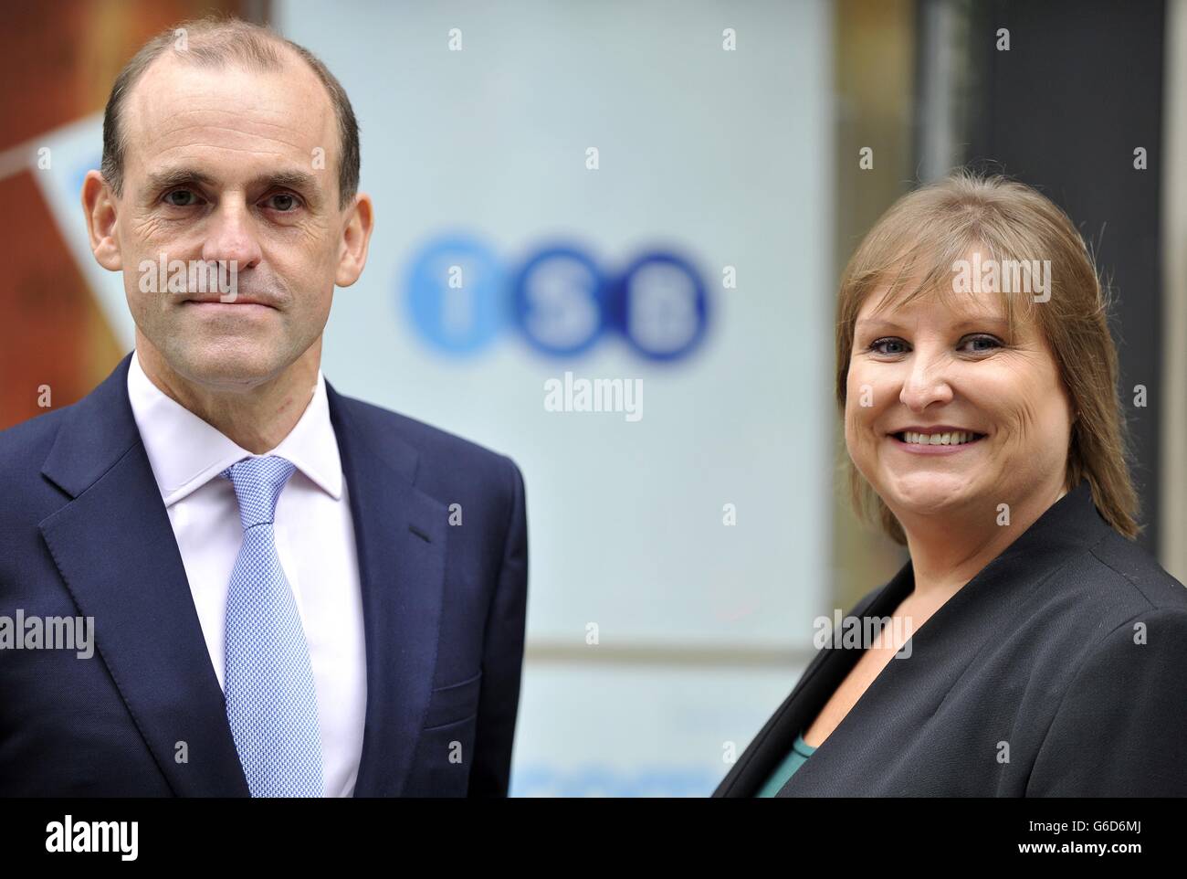TSB chief executive Paul Pester stands with Lloyds Banking Group ...