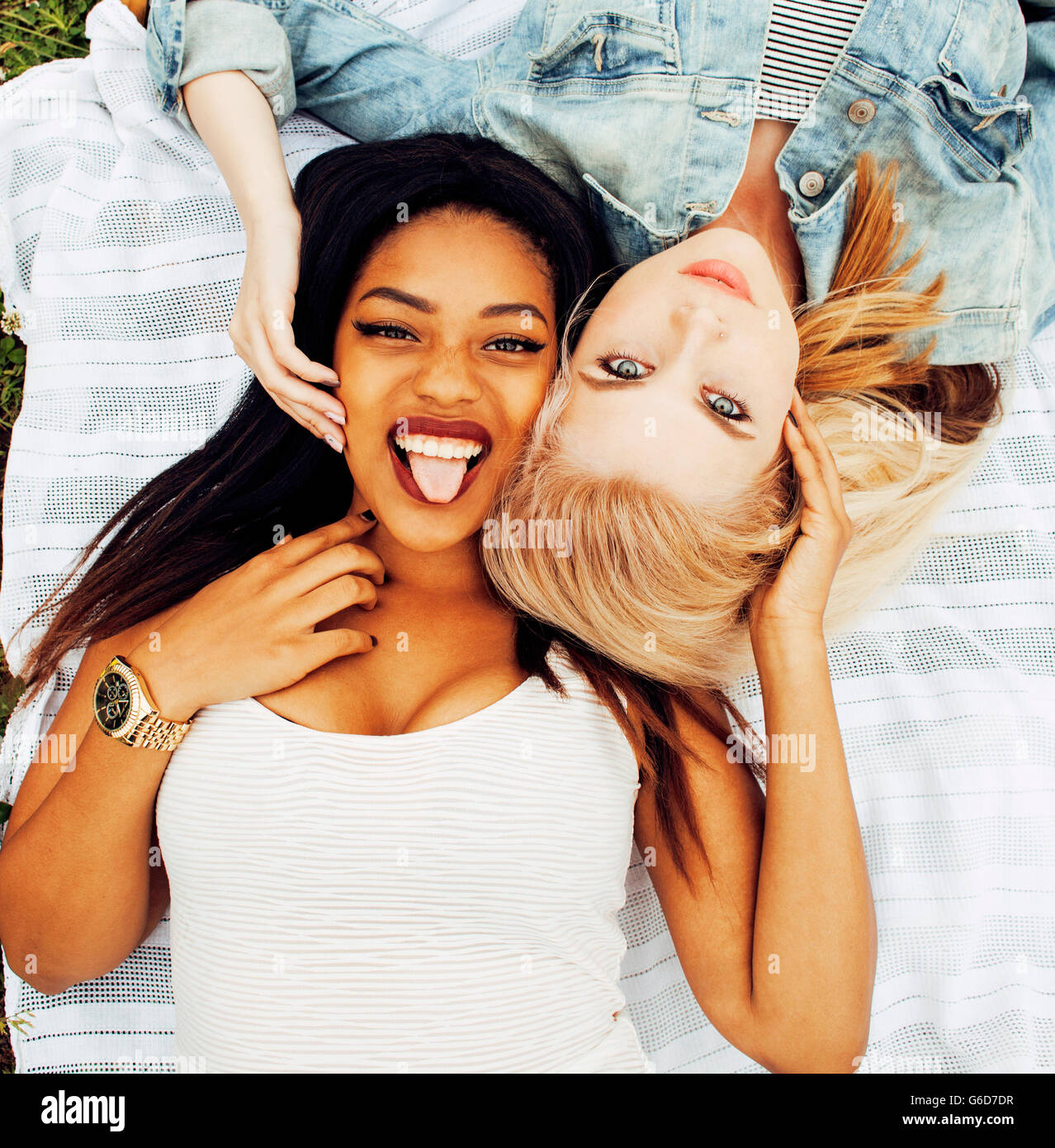 Two Pretty Girls On Grass Happy Smiling Best Friends Having Fun