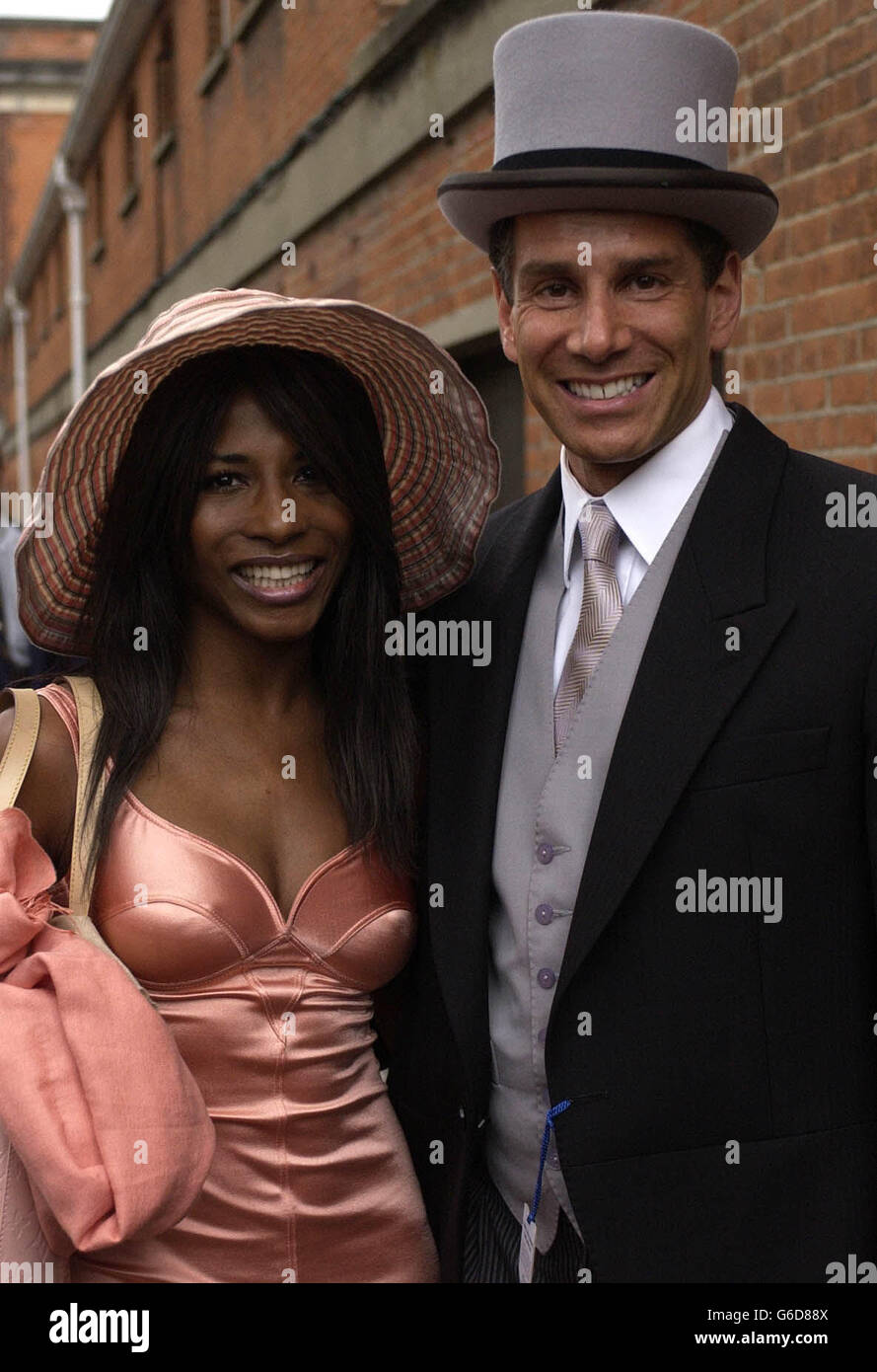 Pop singer Sinitta and her newly wed husband Andy arrive on Ladies Day ...
