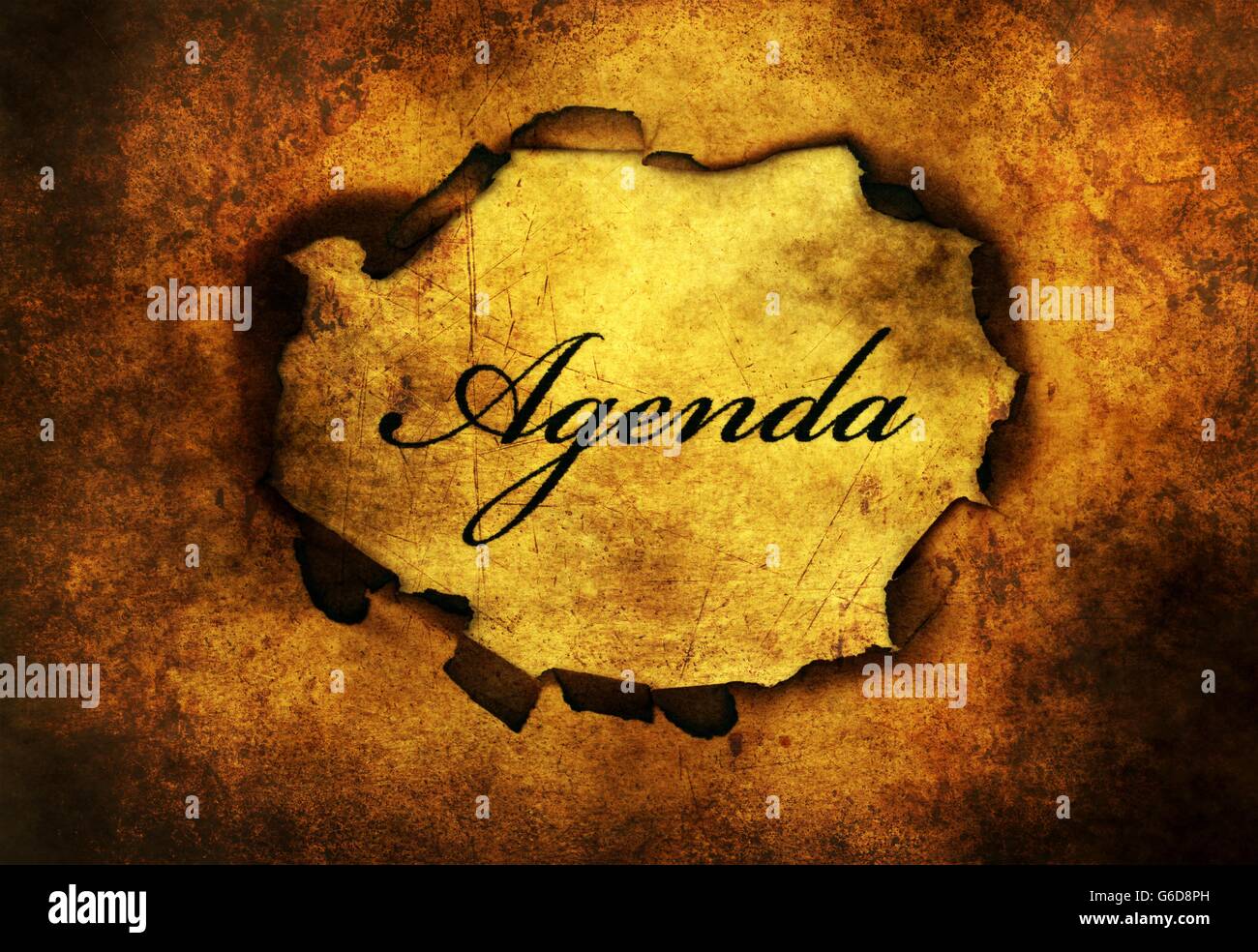Agenda paper hole grunge concept Stock Photo - Alamy