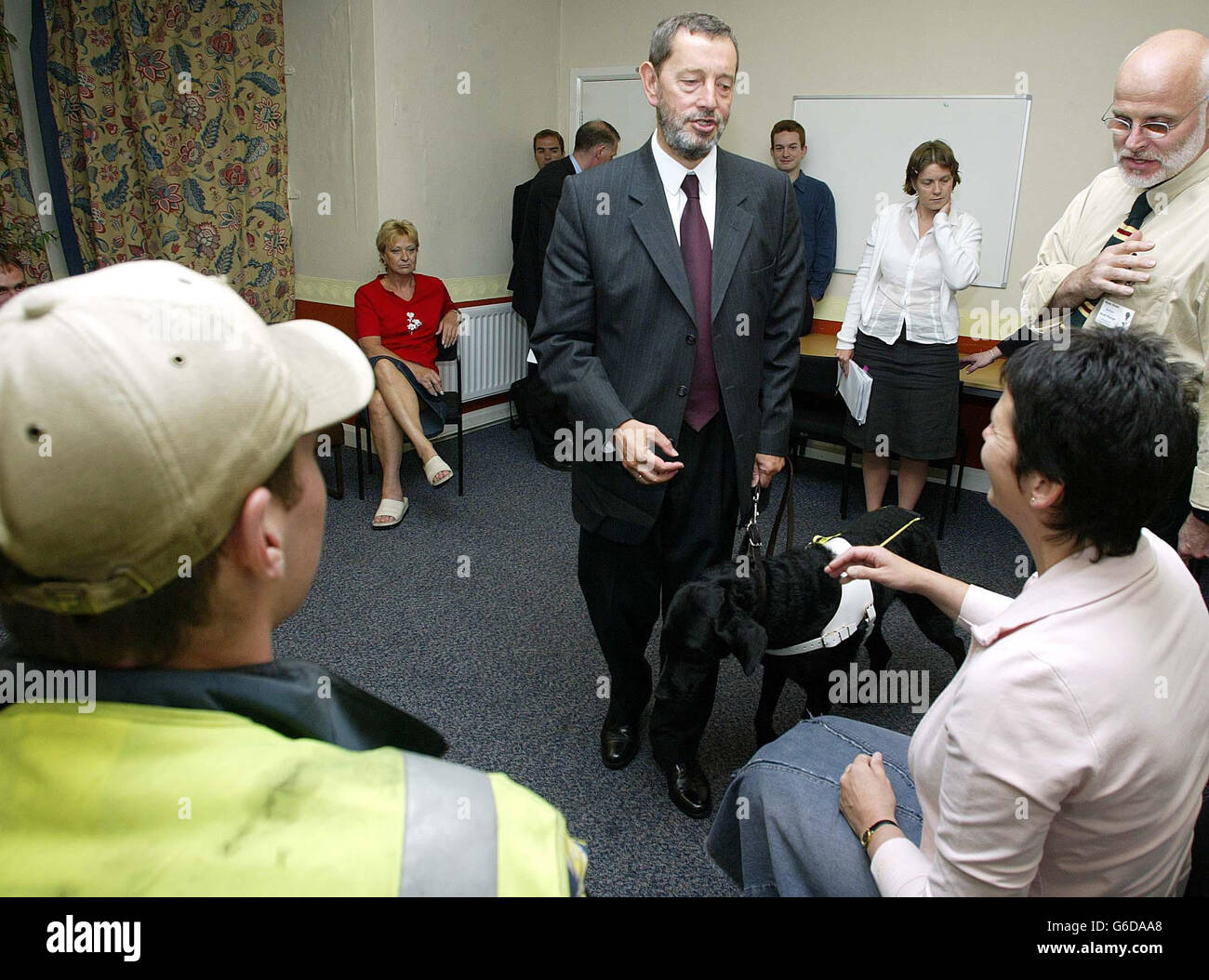 Home Secretary David Blunkett and his guide dog visiting a pioneering ...