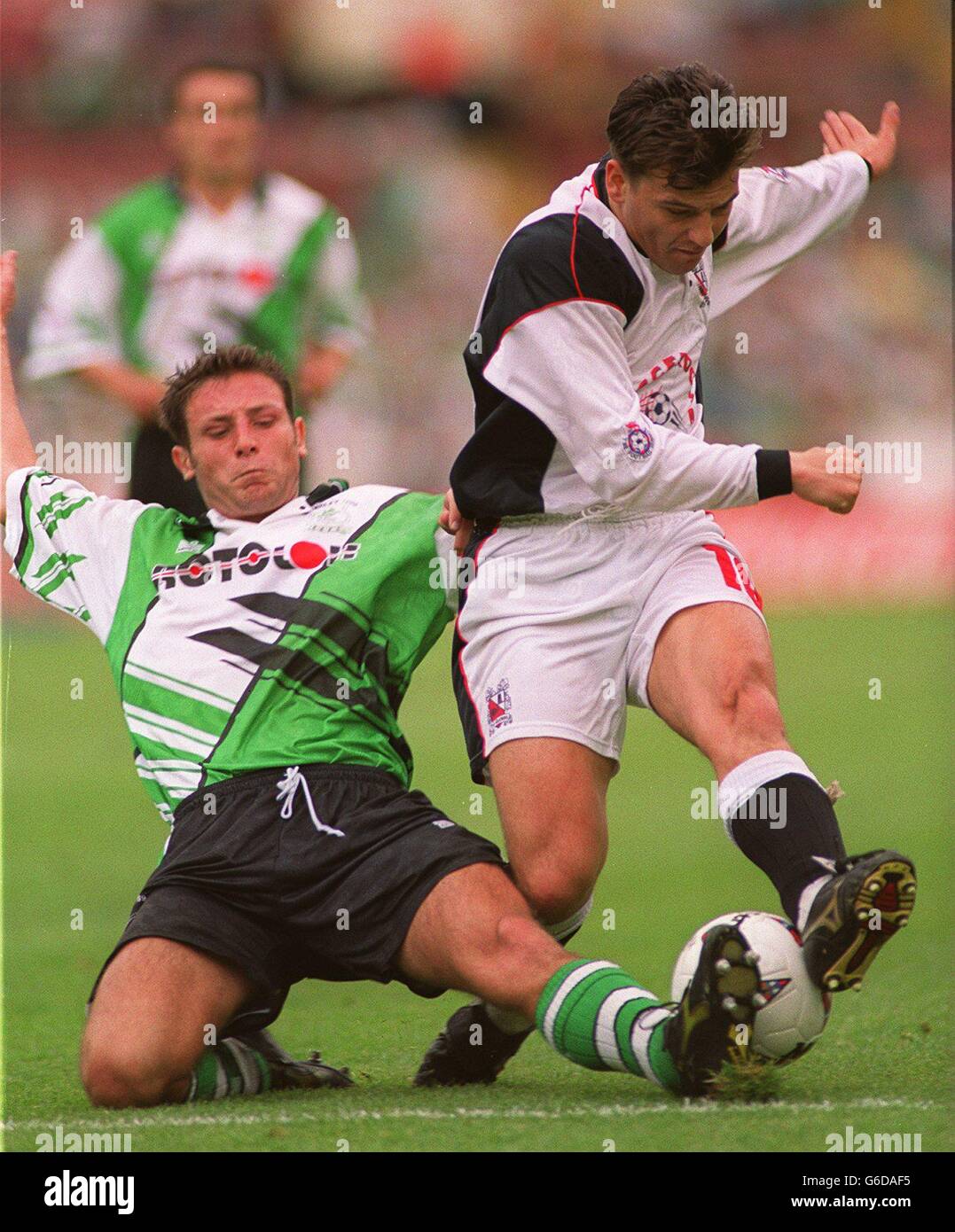 Plymouth's Chris Leadbitter tackles Robert Blake of Darlington Stock ...