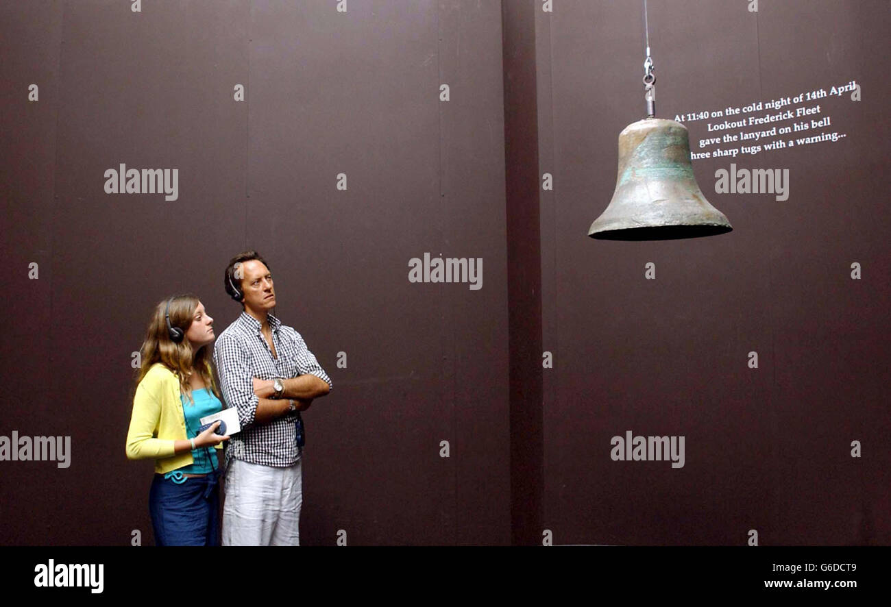 Actor Richard E Grant and his daughter Olivia look at the bell struck ...