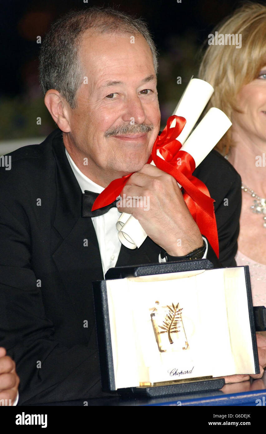 Canadian film director Denys Arcand with the best screenplay award for ...