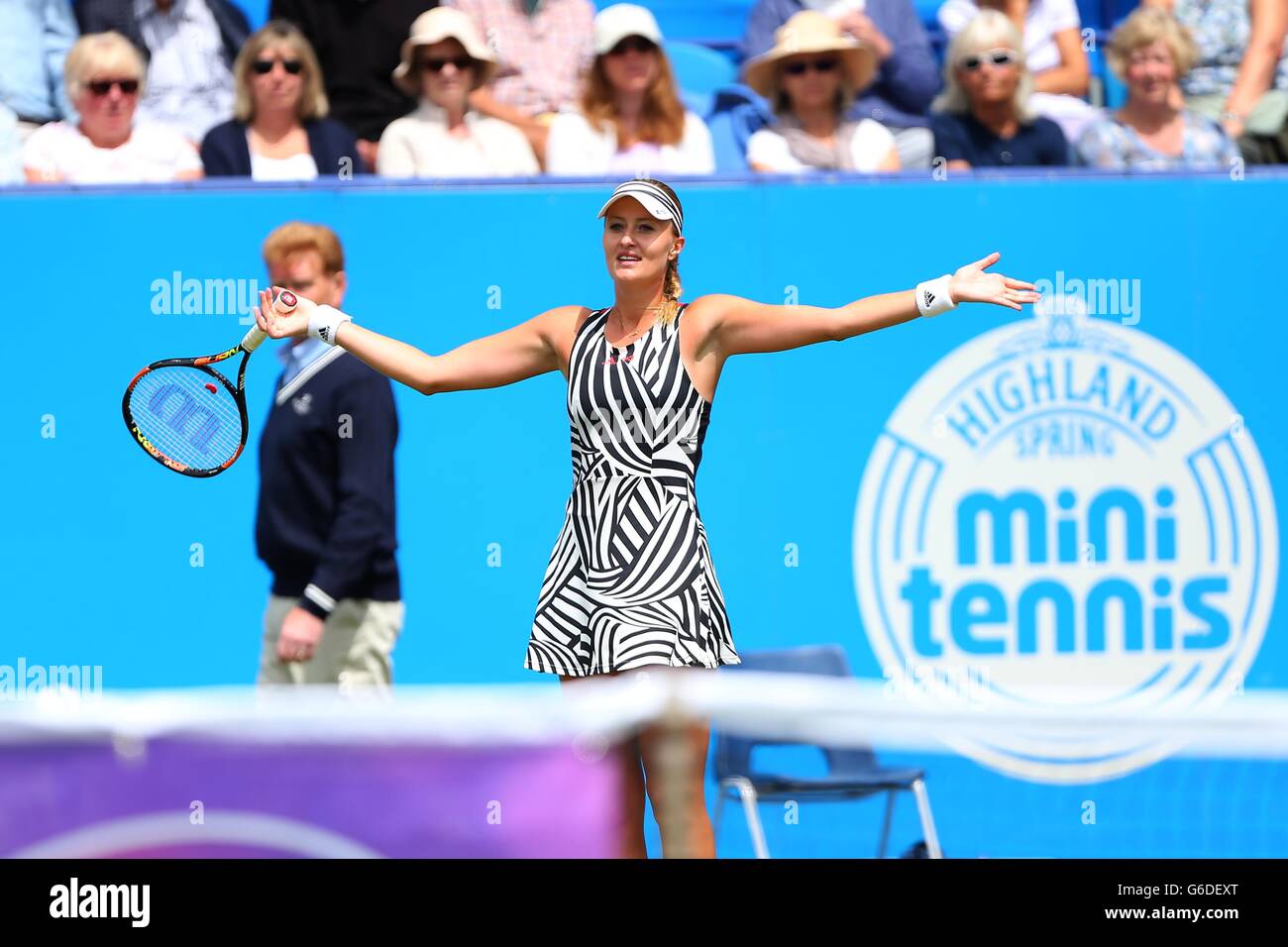 Kristina Mladenovic of France gestures during her match against Timea ...