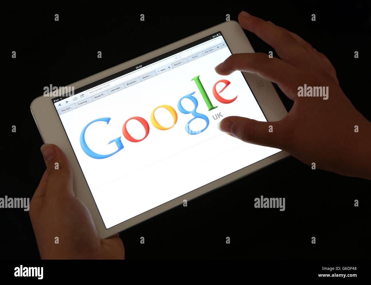 An iPad showing the Google search engine home page as the internet ...